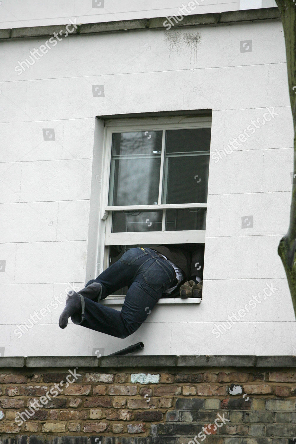 Mystery Man Climbing Through Window New Editorial Stock Photo - Stock ...