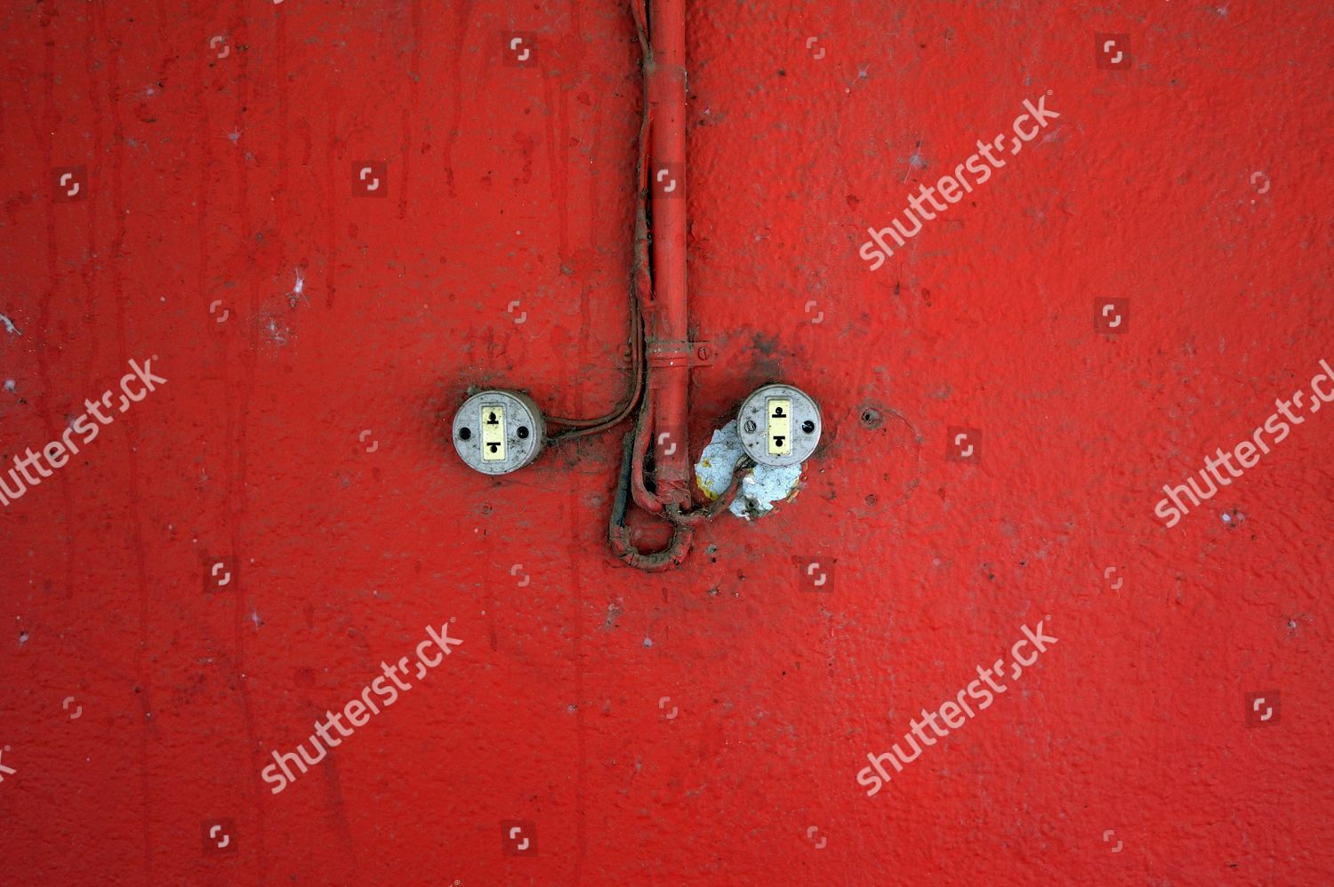 Shoddy Electrical Installation On Red Wall Editorial Stock Photo ...
