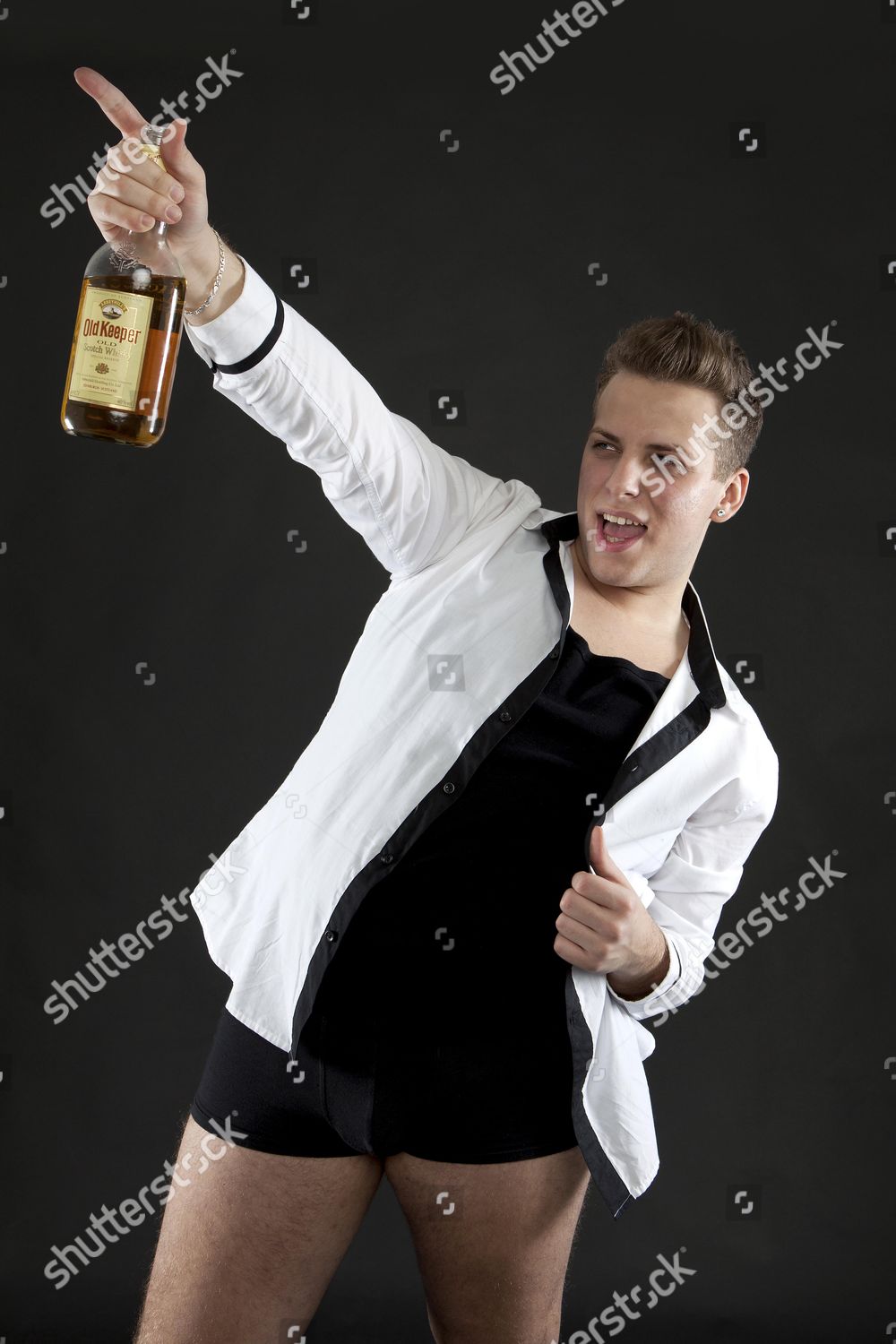 Model Released Young Man Holding Bottle Editorial Stock Photo - Stock ...