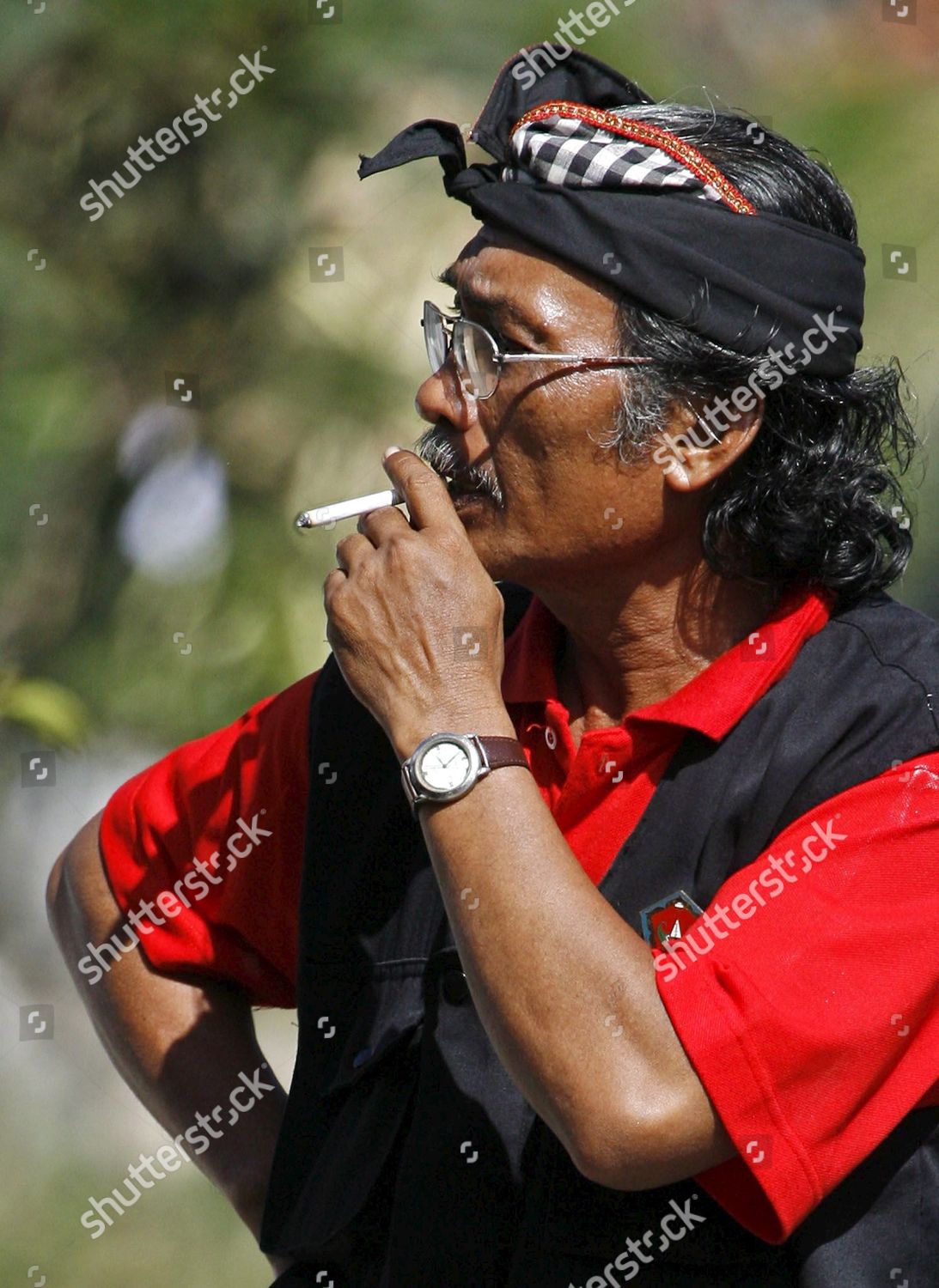 Balinese Smoker Lights Cigarette Denpasar Bali Editorial Stock Photo ...