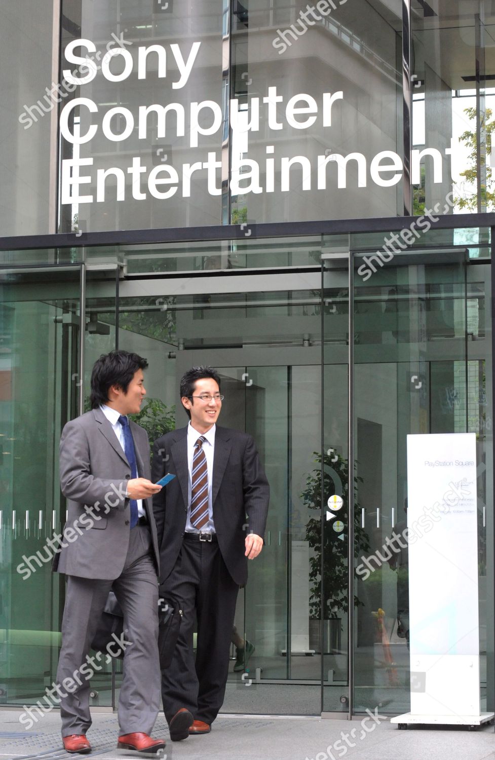 Japanese Businessmen Walk Outside Sony Computer Editorial Stock Photo ...