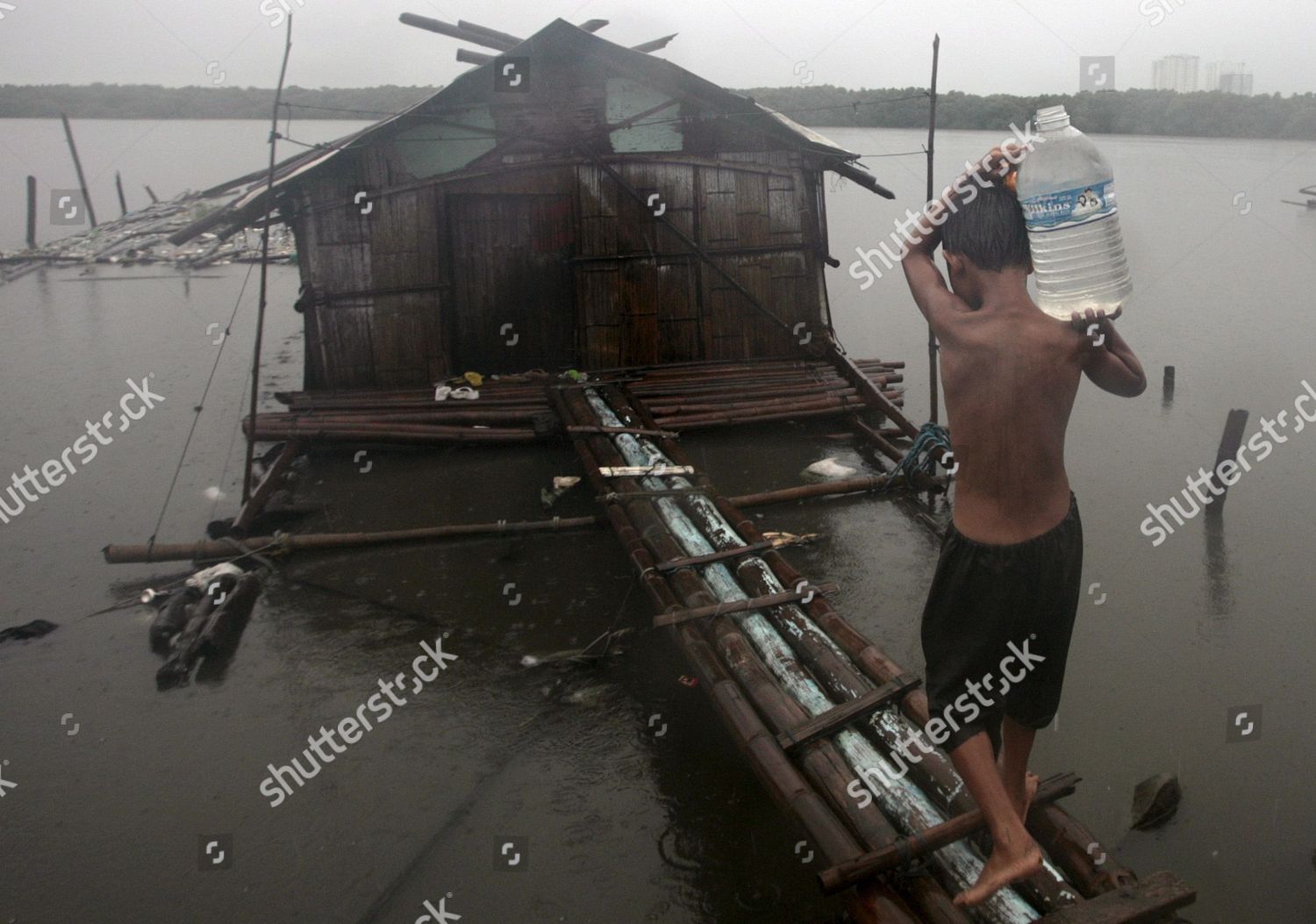 FILIPINO BOY DRENCHED TORRENTIAL RAIN CARRIES Editorial Stock Photo ...