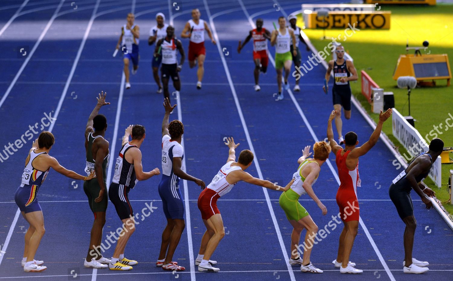 Runnser Hand Over Batton During 4x400m Editorial Stock Photo - Stock ...