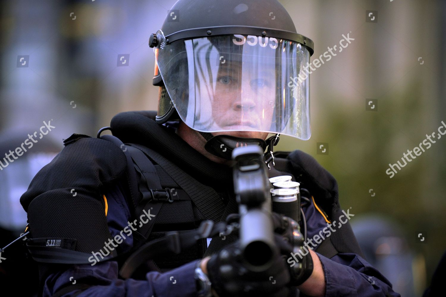 Policeman Wearing Riot Gear Aims His Editorial Stock Photo - Stock ...