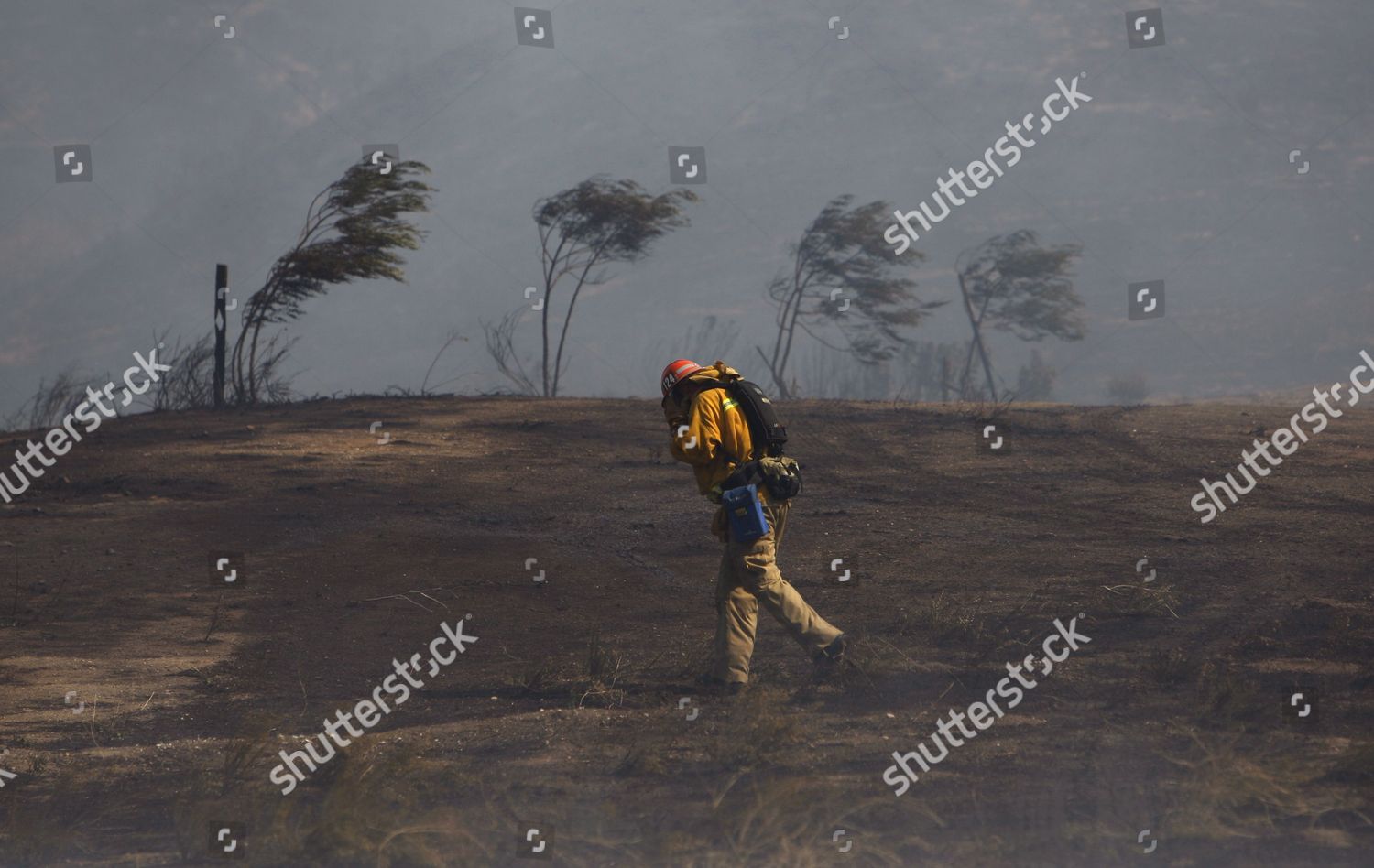 Firefighter Walks Into High Winds While Editorial Stock Photo - Stock ...