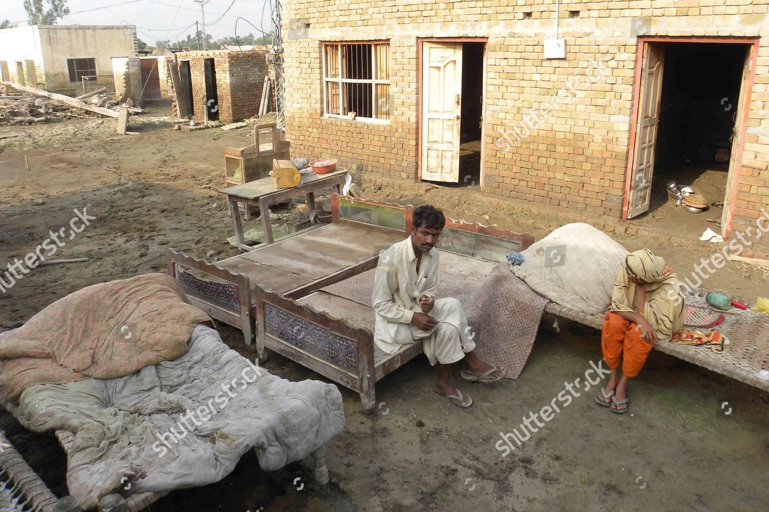 People Affected By Floods Sit Beside Editorial Stock Photo - Stock ...