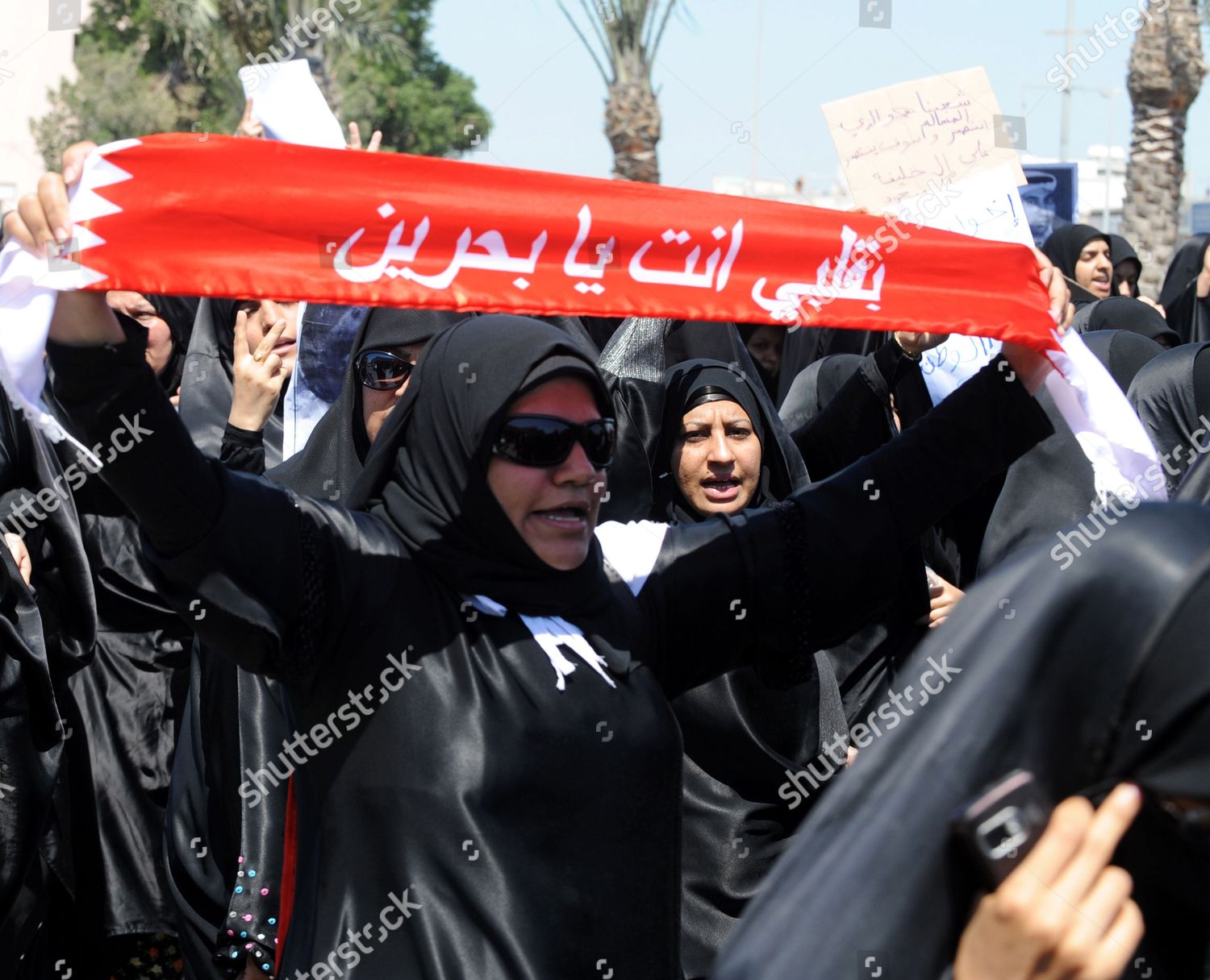 BAHRAINI WOMAN RAISES SCARF WORDS 'BAHRAIN Editorial Stock Photo ...