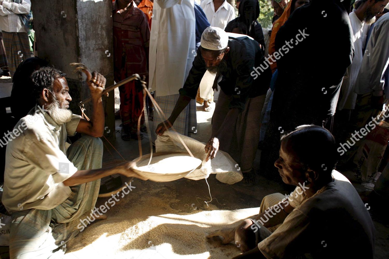 Bangladeshi Cycloneaffected People Receive Rice Relief Editorial Stock ...