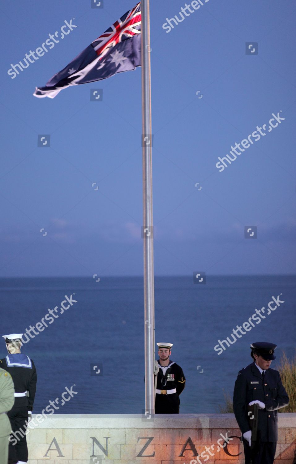 Anzac Soldiers Salute Under Australian Flag Editorial Stock Photo ...