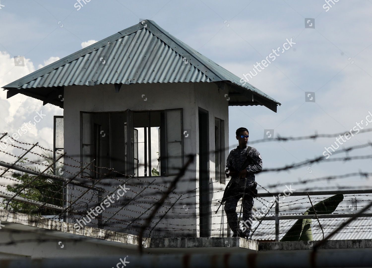 Filipino Jail Officer Stands Guard During Editorial Stock Photo - Stock ...