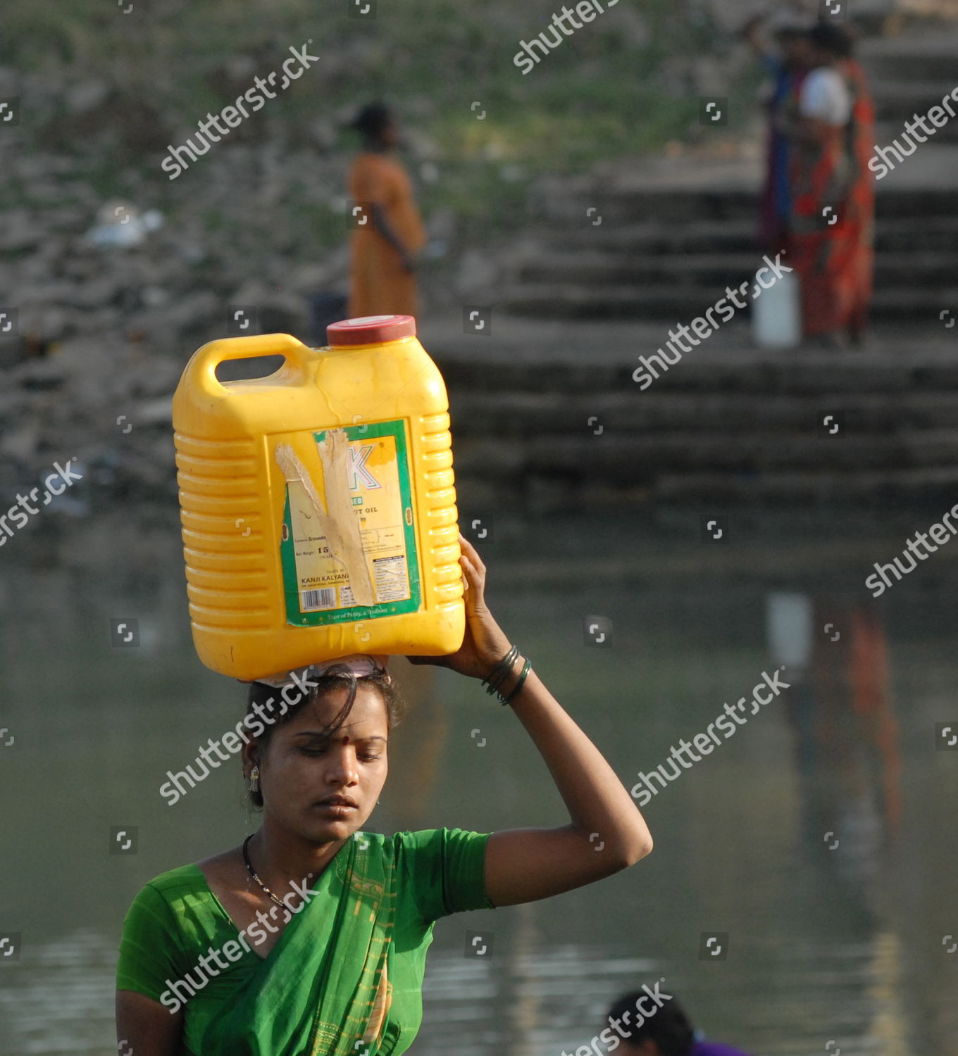 Local Woman Carries Water Container On Editorial Stock Photo - Stock ...