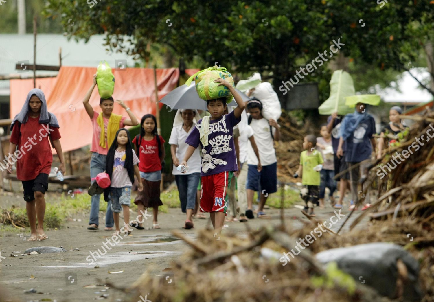 Filipino Flood Victims Carry Relief Goods Editorial Stock Photo - Stock ...