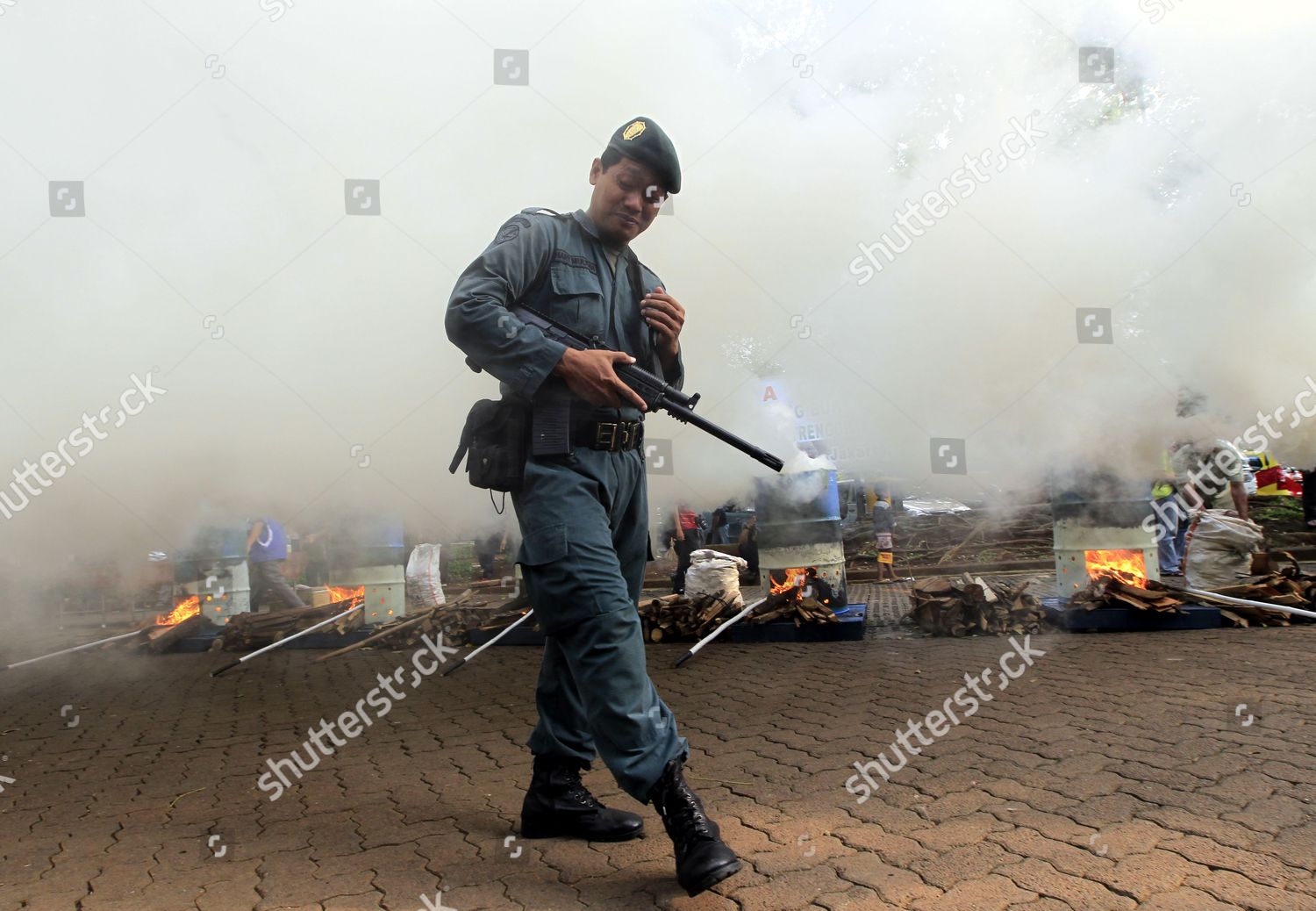 Indonesian Ranger Turns Away Smoke During Editorial Stock Photo - Stock ...