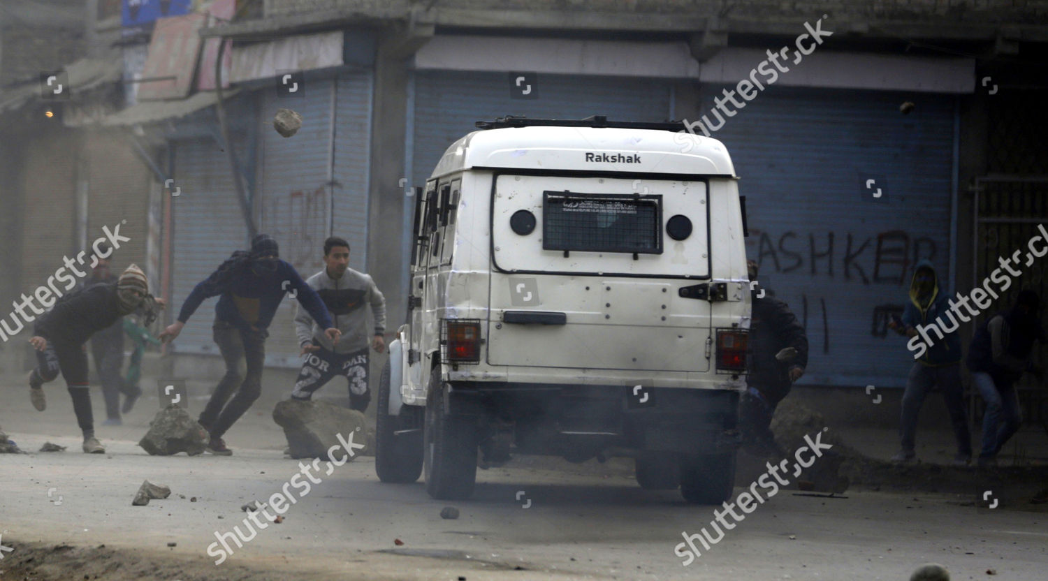 Kashmiri Protestors Throw Stones Vehicle Indian Editorial Stock Photo ...