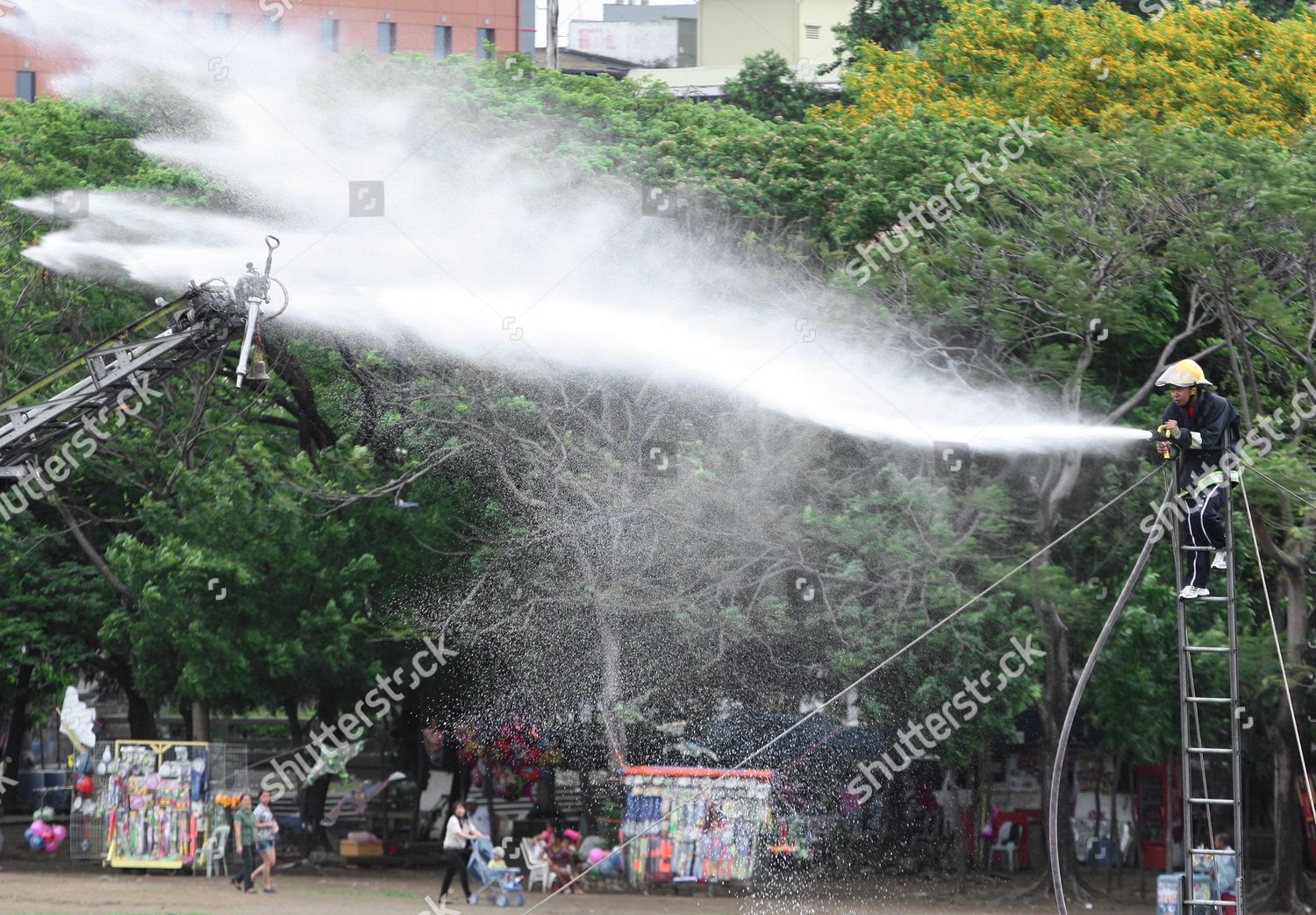 Filipino Firefighter Aims Water Hose Toward Editorial Stock Photo ...