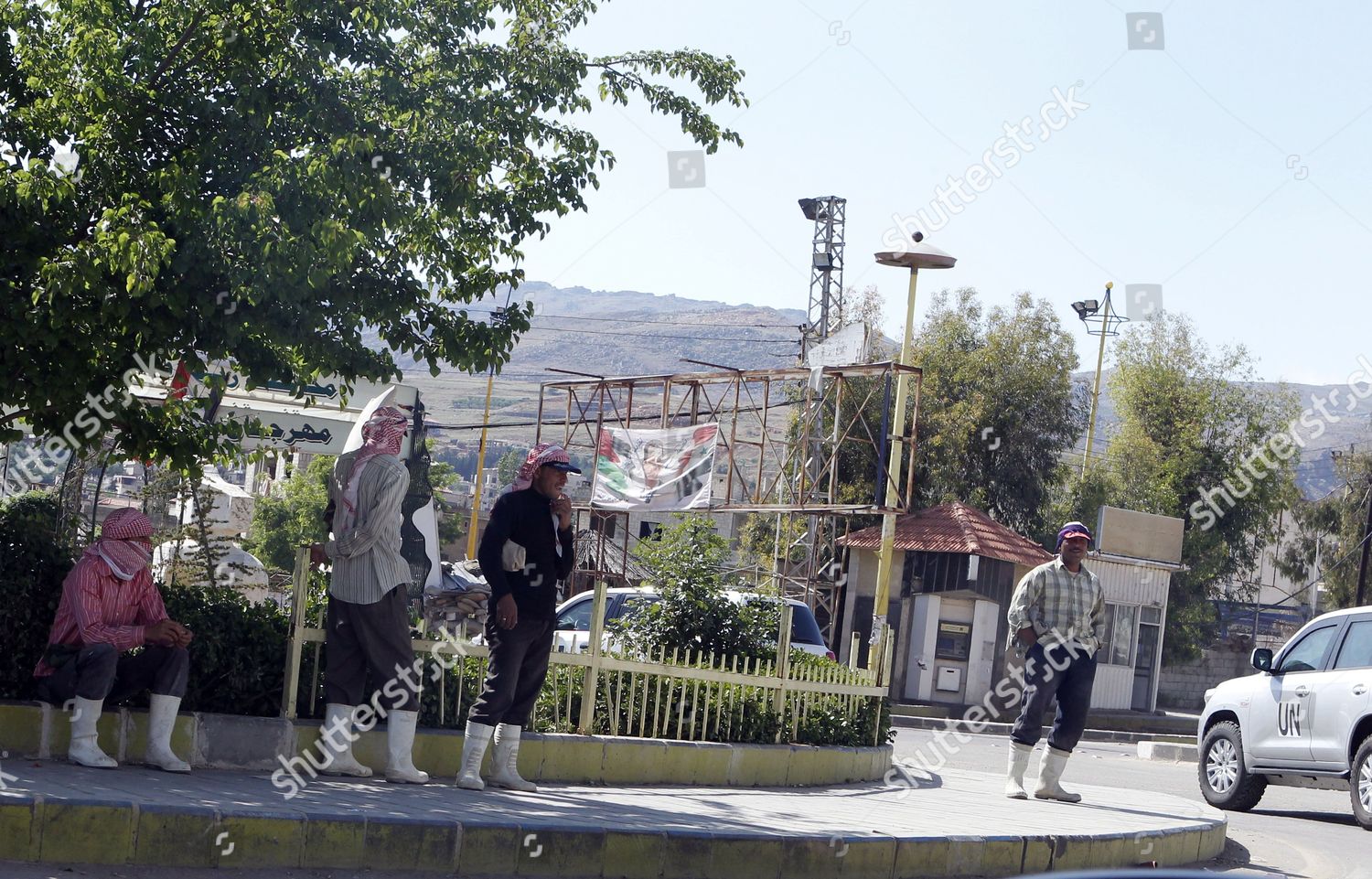 Syrian Workers Seen Passing Near Un Editorial Stock Photo - Stock Image ...