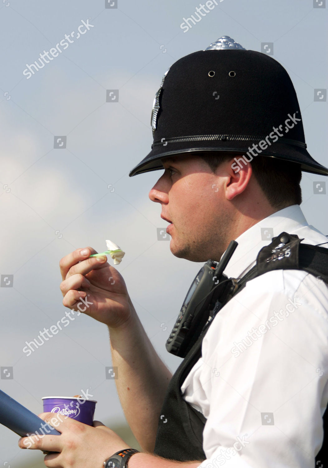 Police Officer Eating Ice Cream Editorial Stock Photo - Stock Image ...