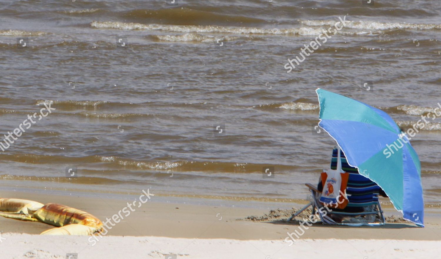 Beachgoer Set Near Oilstained Boom Bay Editorial Stock Photo - Stock ...