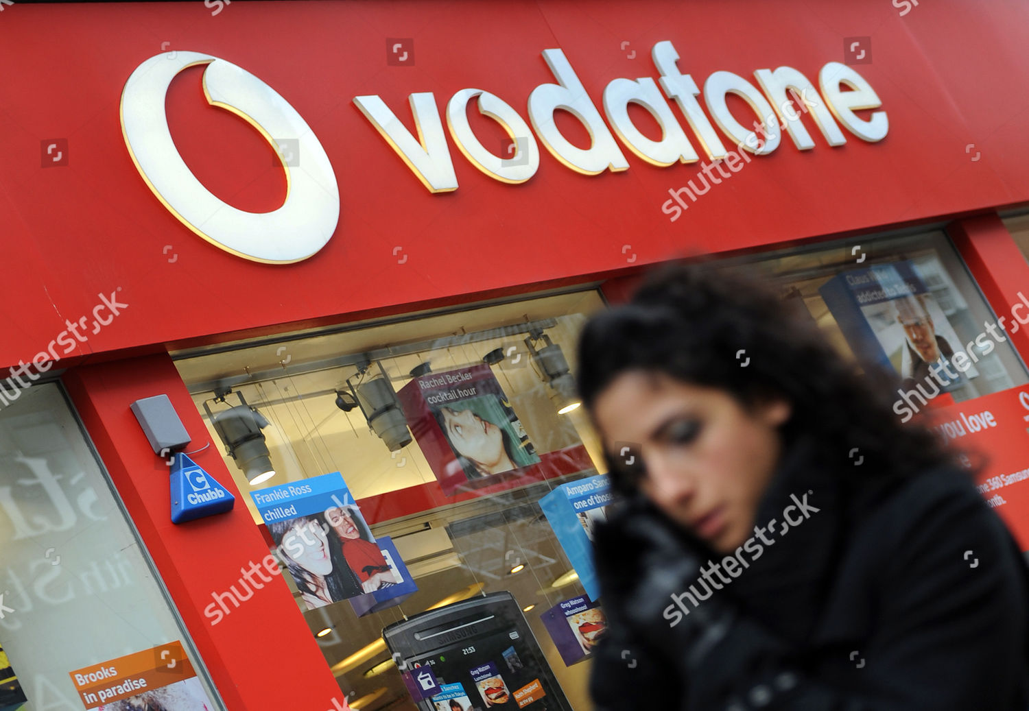 Pedestrian Passes Vodafone Store London Britain Editorial Stock Photo ...