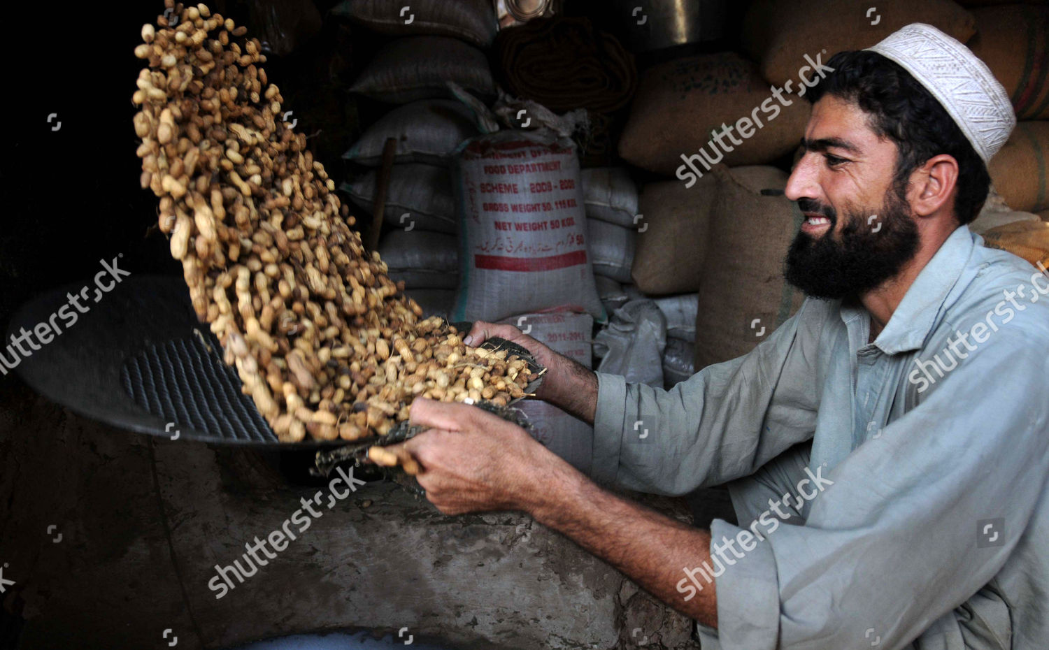 Pakistani Vendor Prepares Peanuts On Roadside Editorial Stock Photo ...