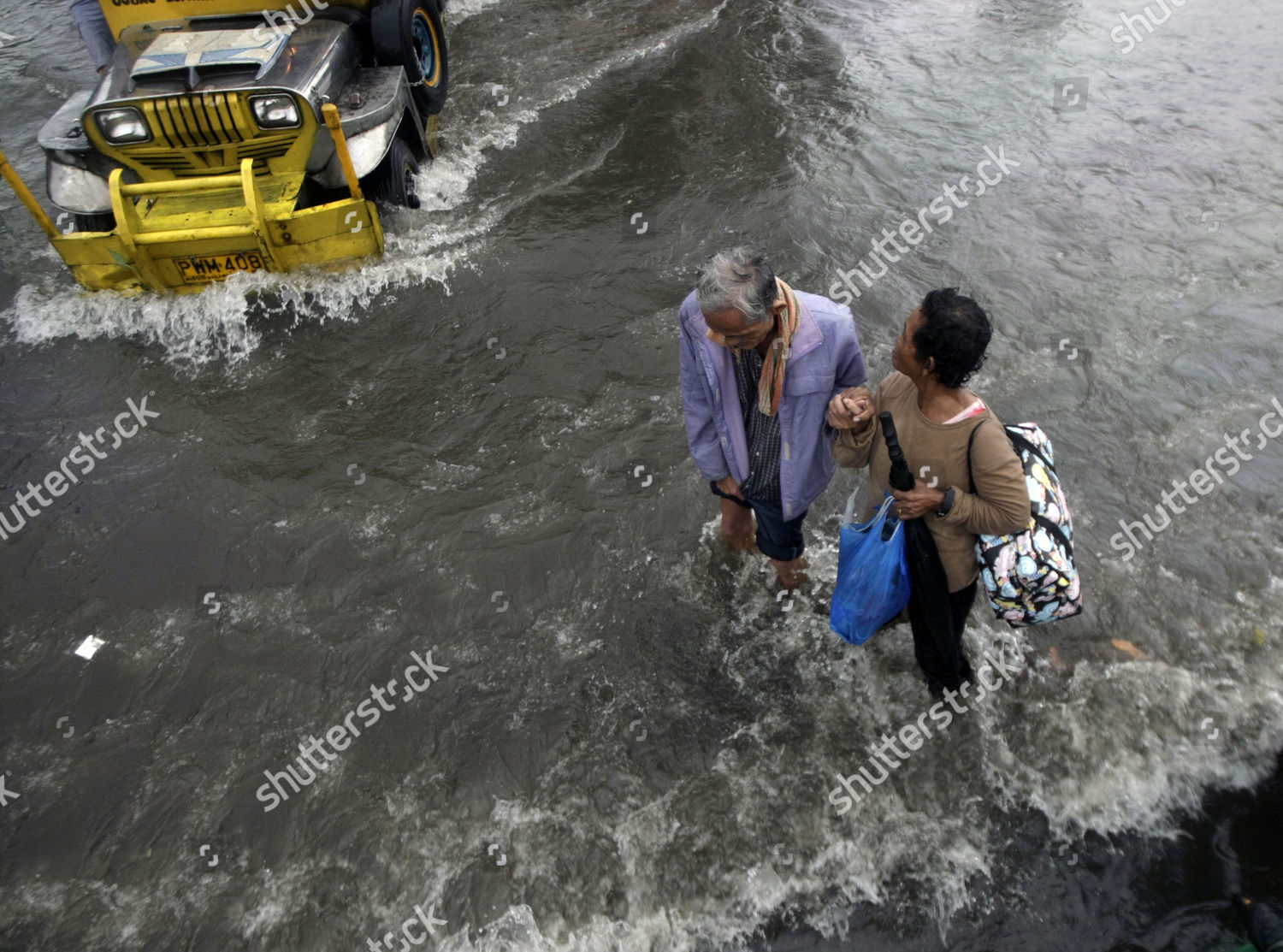 Filipino Residents Wade Through Flooded Street Editorial Stock Photo - Stock Image | Shutterstock