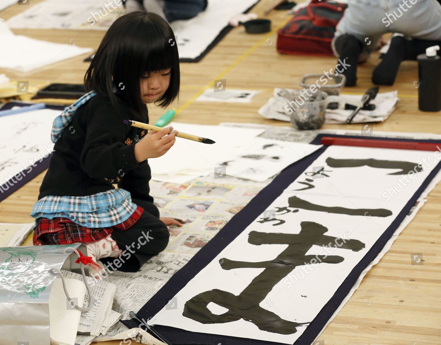 Little Girl Checks Her Calligraphy Work Editorial Stock Photo - Stock ...
