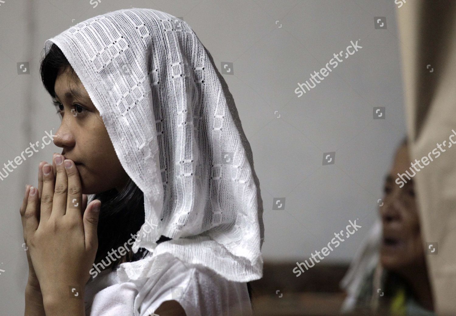 Filipino Chants Her Prayers During Their Editorial Stock Photo - Stock ...