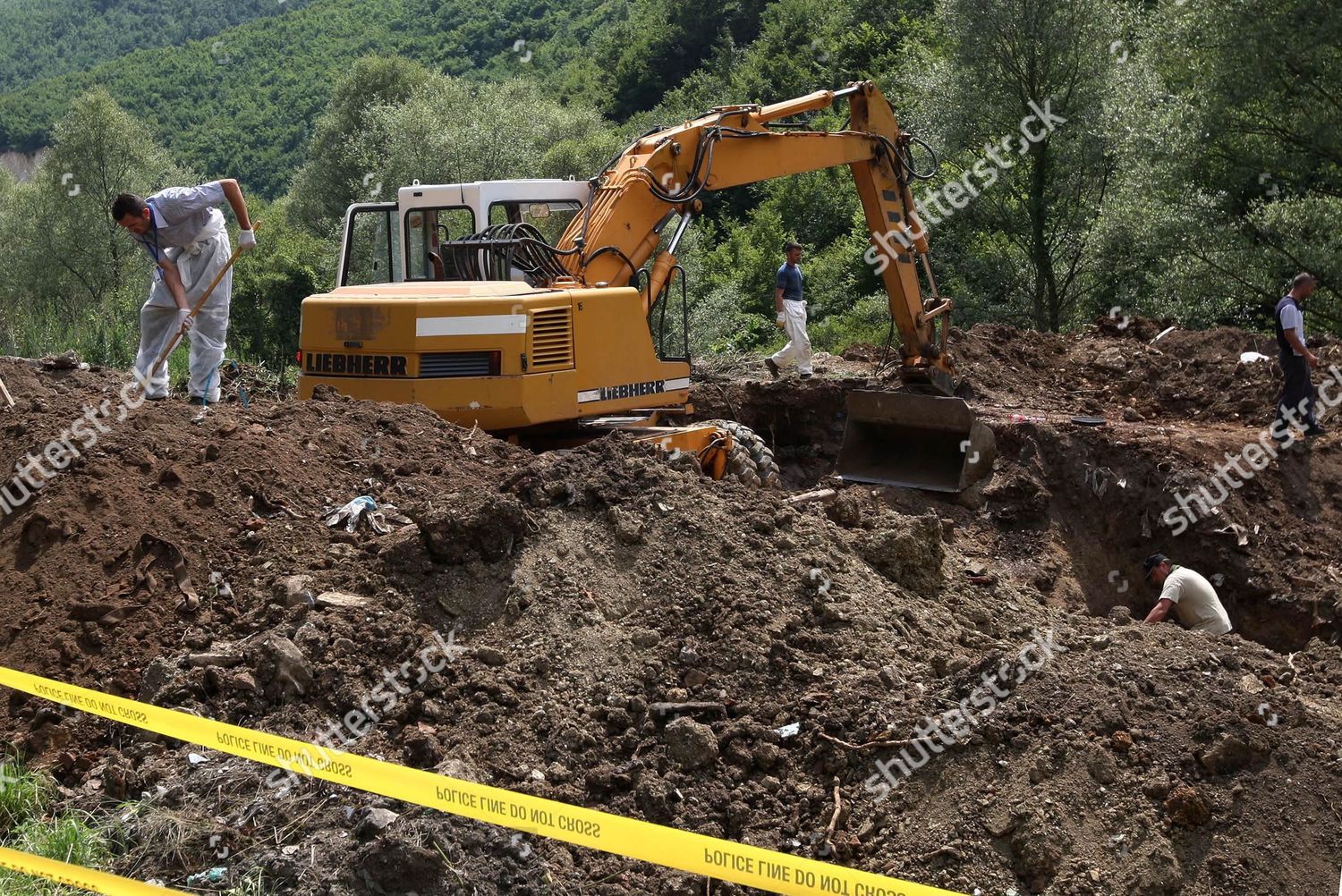 Forensic Experts Digging Mass Grave Site Editorial Stock Photo - Stock ...