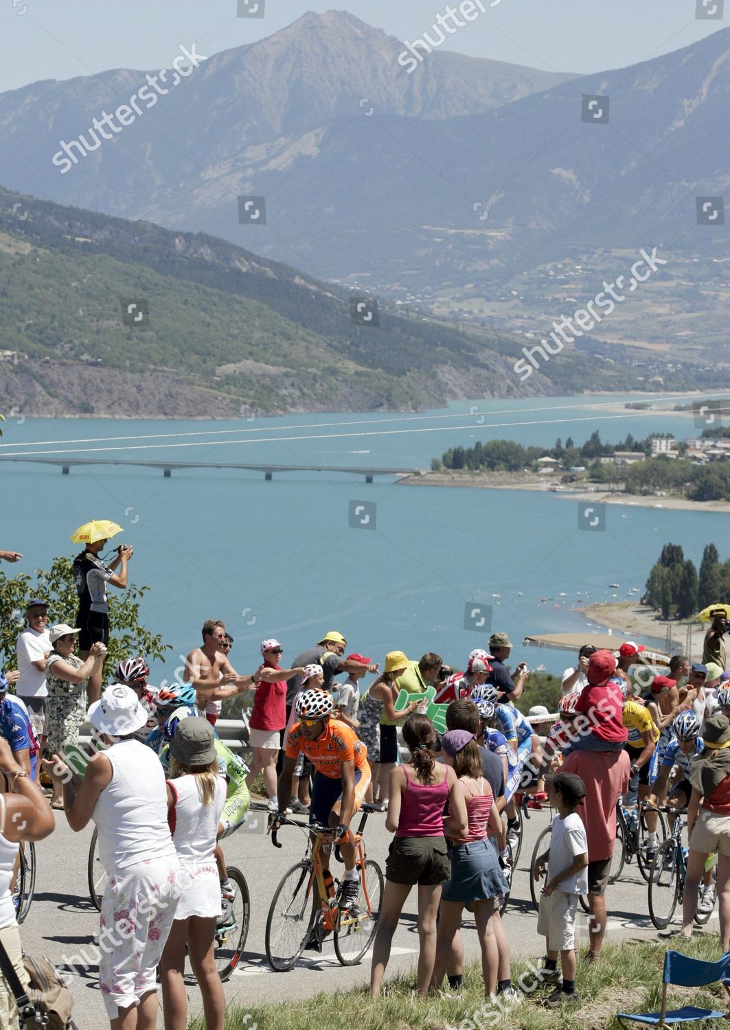 Riders Watched By Spectators Lining Road Editorial Stock Photo - Stock ...