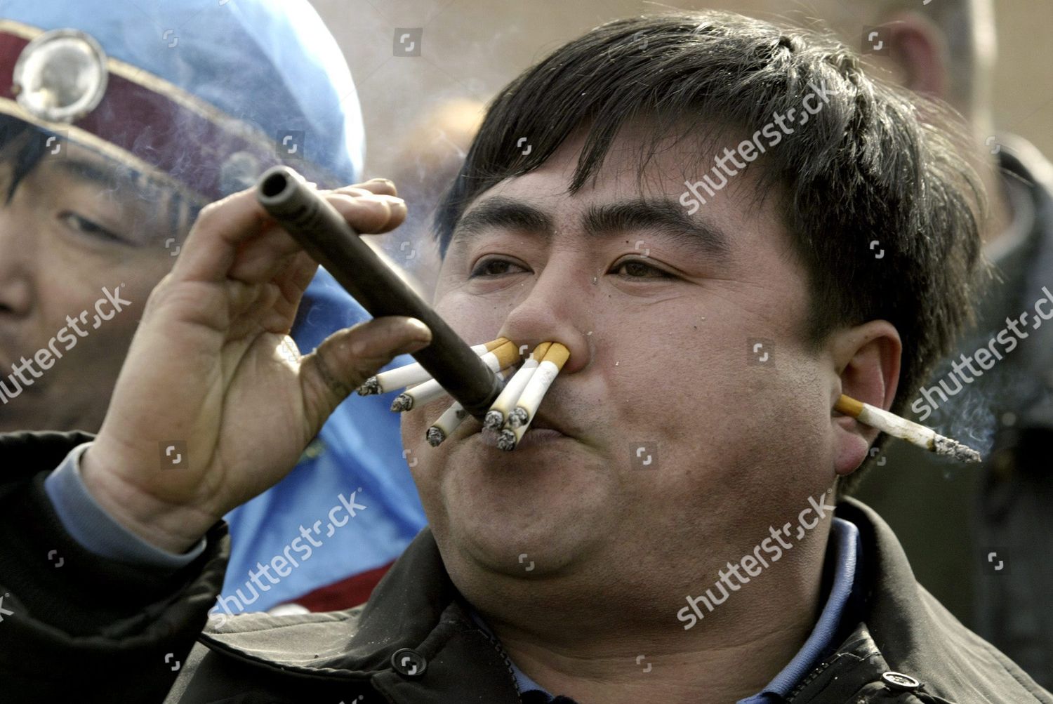 Man Smokes Multiple Cigarettes Through His Editorial Stock Photo ...