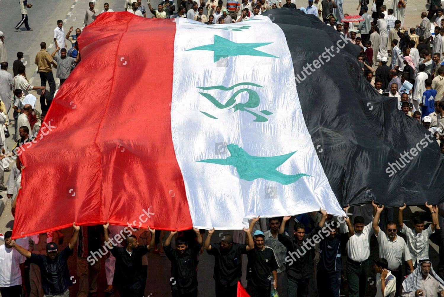 Iraqis Hold Their National Flag During Editorial Stock Photo - Stock ...