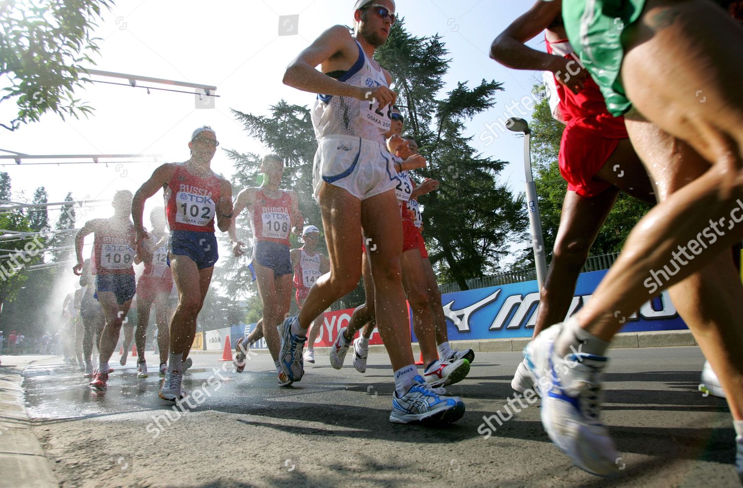 Athletes Passing Mist Station During Mens Editorial Stock Photo - Stock ...