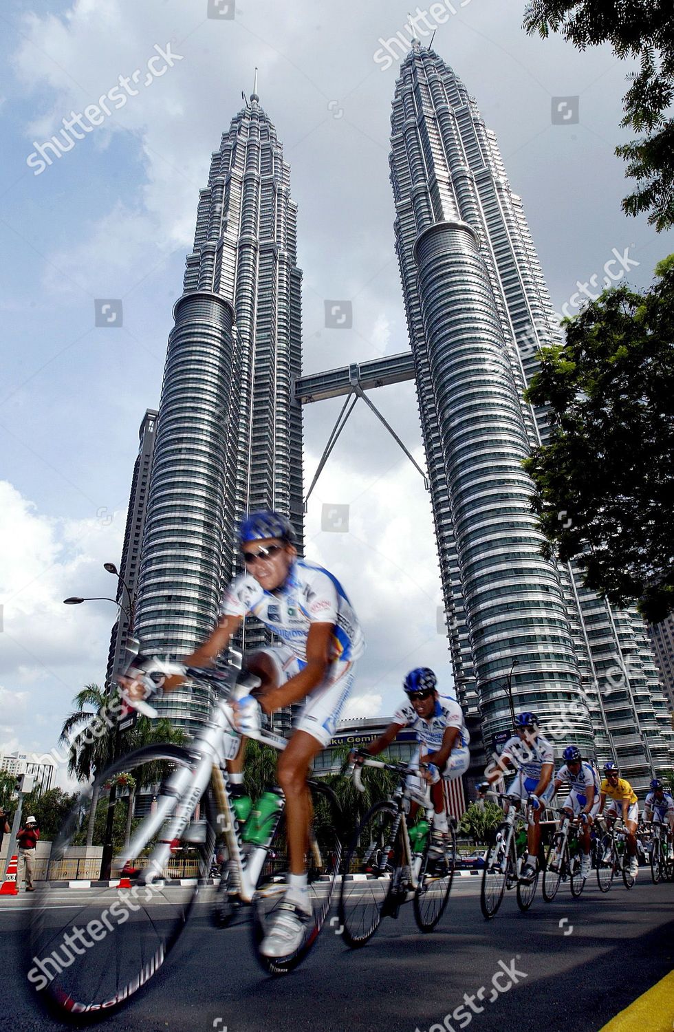 Cyclists Cycle Past Petronas Twin Towers Editorial Stock Photo - Stock ...