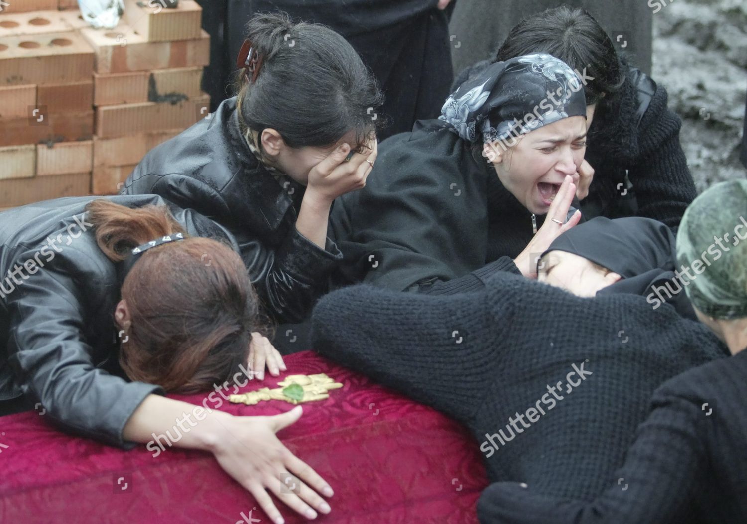 Women Cry Over Coffin During Funeral Editorial Stock Photo - Stock ...