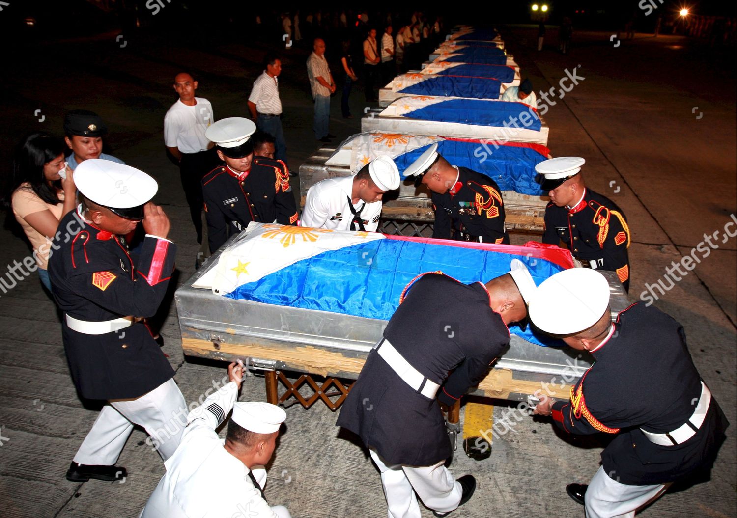 Filipino Marines Arrange Sealed Caskets Containing Editorial Stock ...