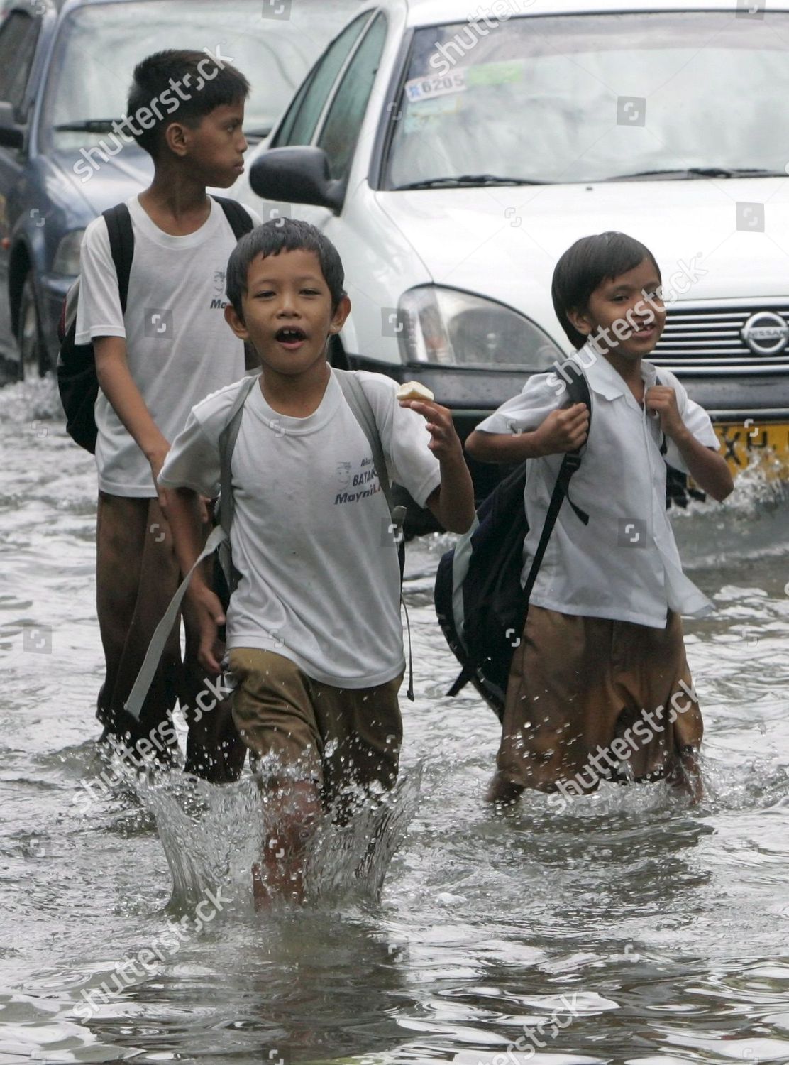 Filipino Students Wade Through Flooded Streets Editorial Stock Photo - Stock Image | Shutterstock