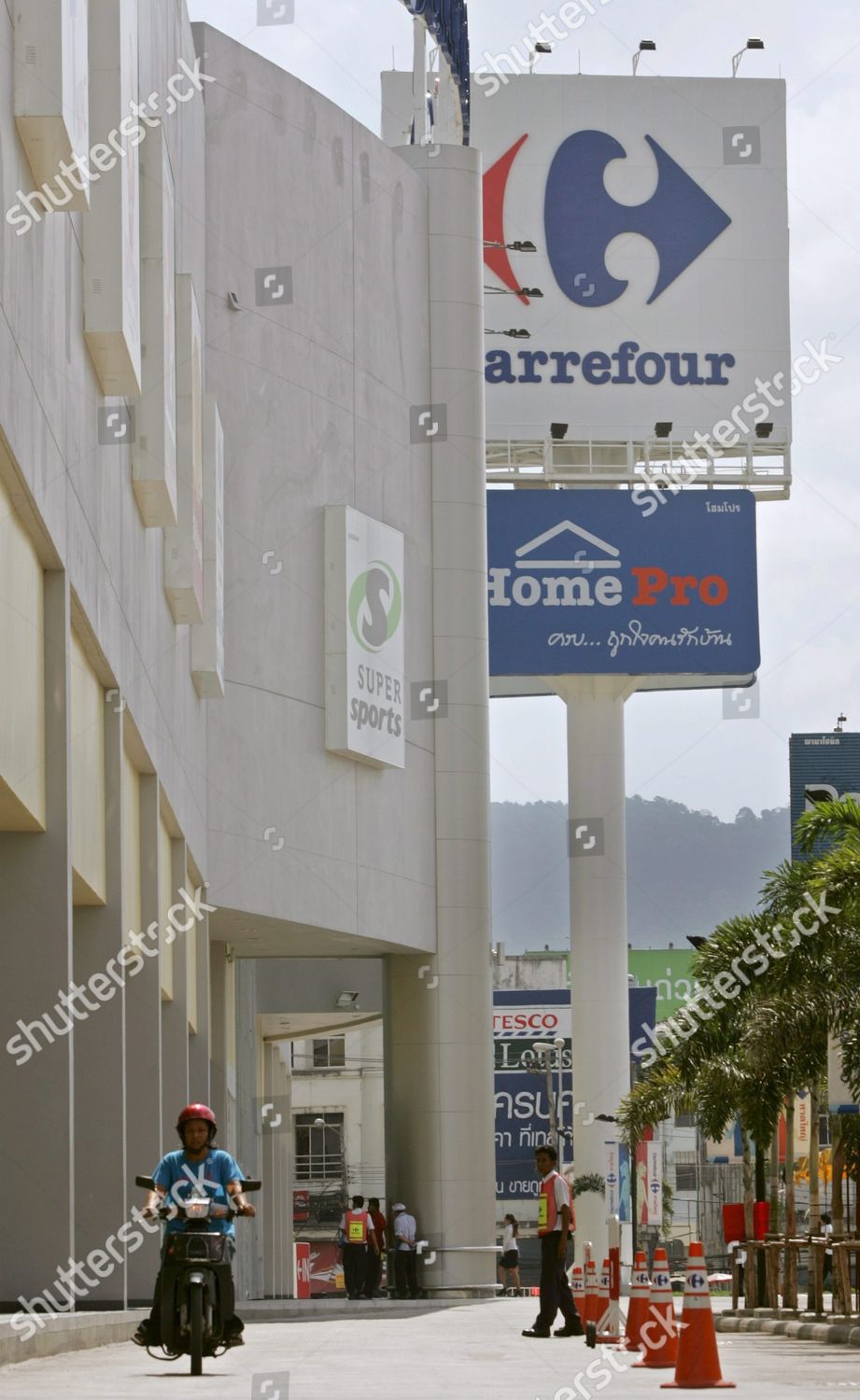 Motorcyclist Passes Frenchowned Carrefour Convenience Store Editorial ...