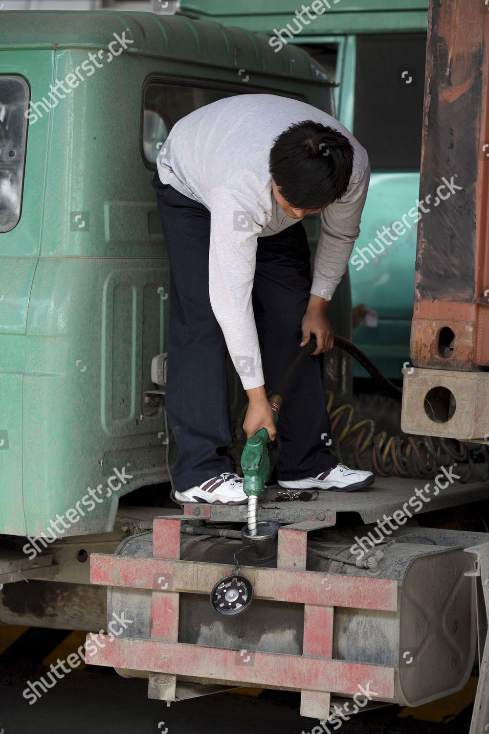 Trucker Operates Pump Diesel Gas Station Editorial Stock Photo - Stock ...