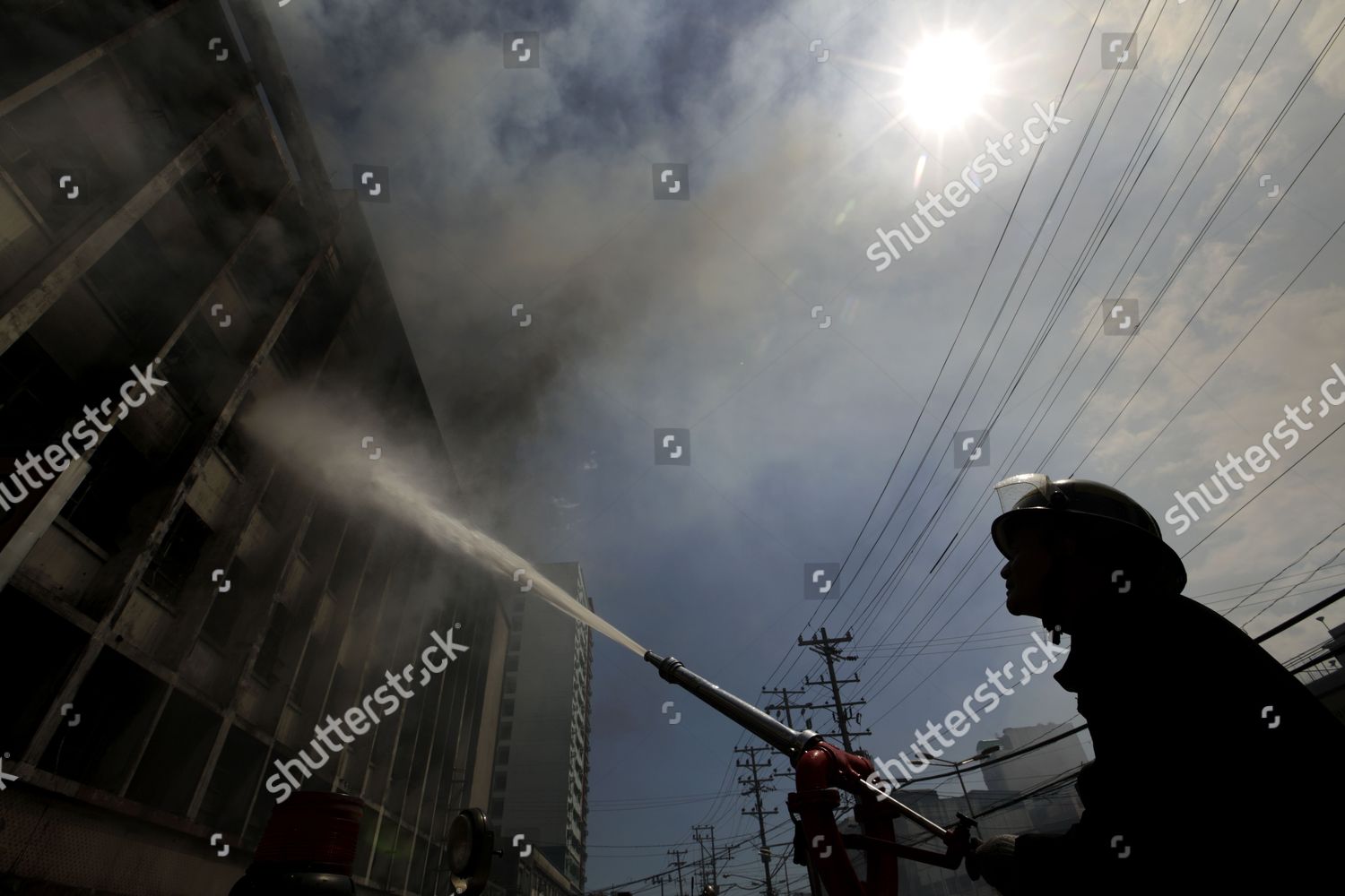 Filipino Fireman Uses Water Cannon Extinguish Editorial Stock Photo ...