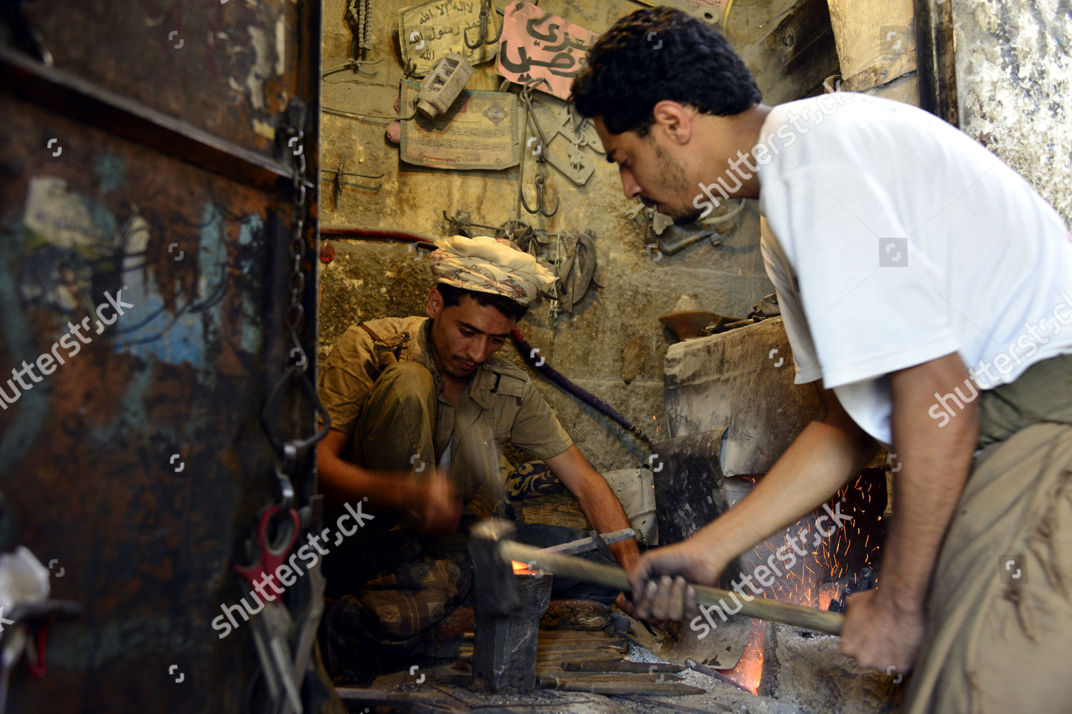 Yemeni Blacksmiths Work Inside His Shop Editorial Stock Photo - Stock ...
