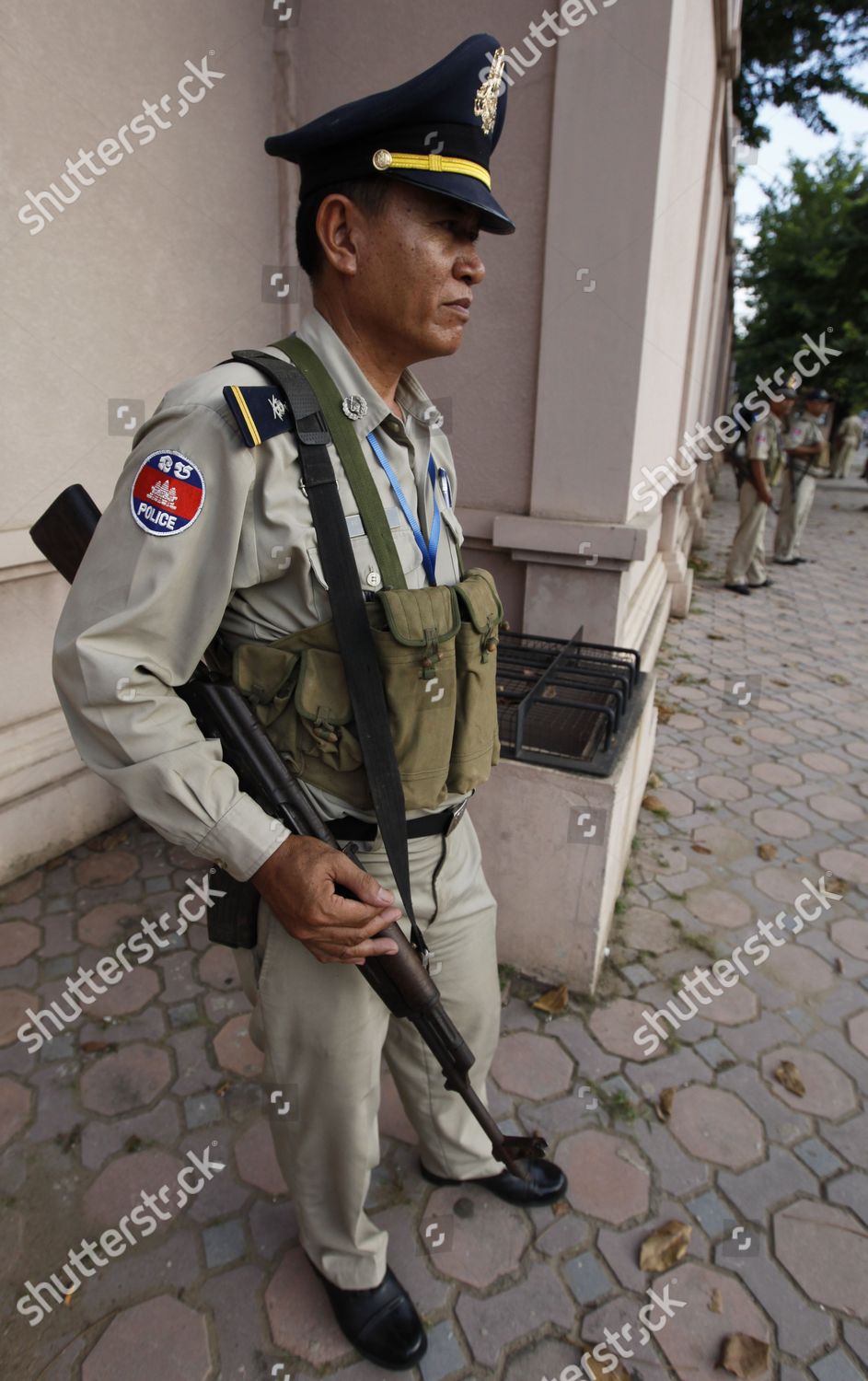 Cambodian Police Officer Stands Guard Outside Editorial Stock Photo ...