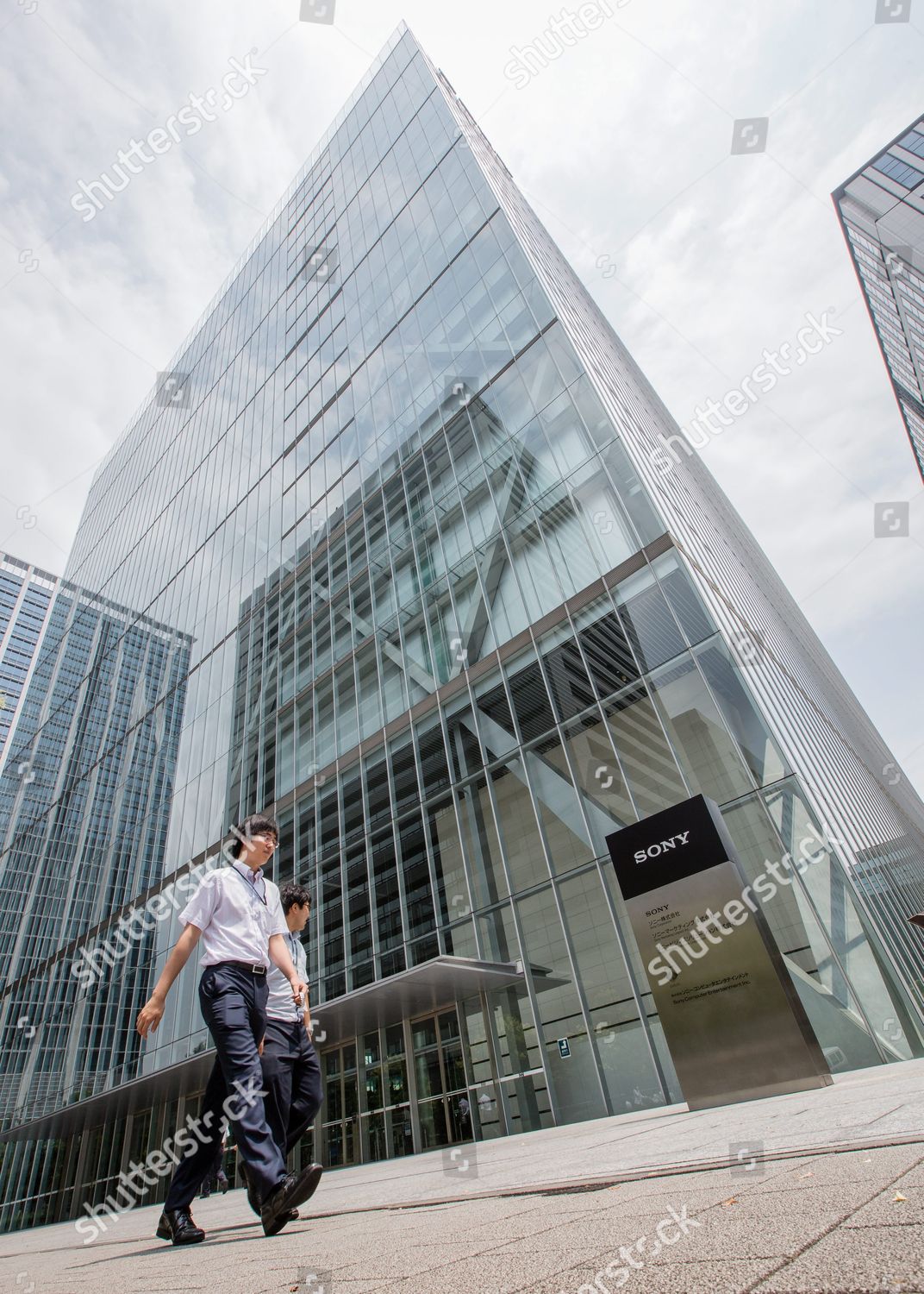Businessmen Walk Past Sony Building Headquarters Editorial Stock Photo ...