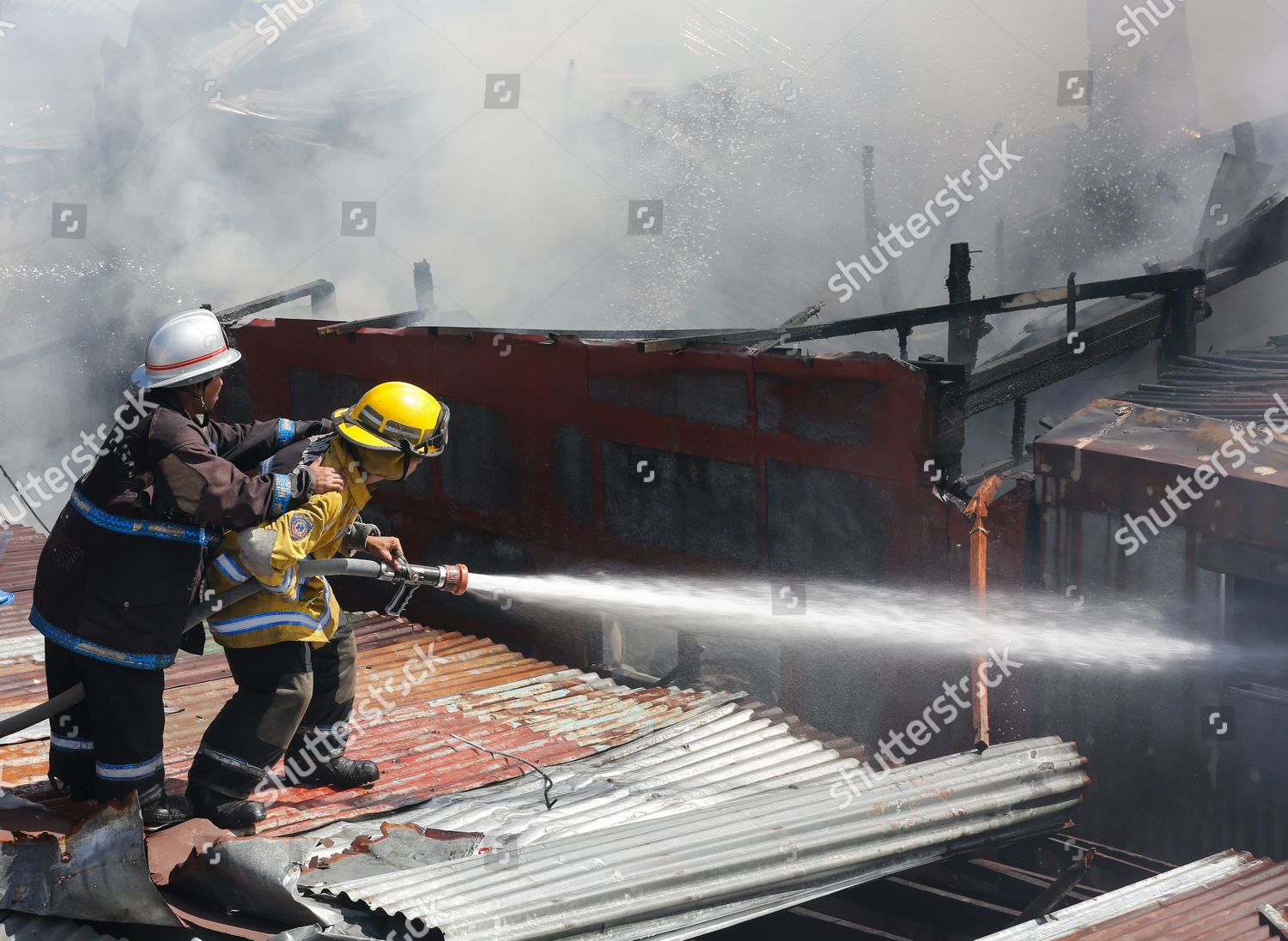 Filipino Firefighters Extinguish Remaining Fire Manila Editorial Stock ...