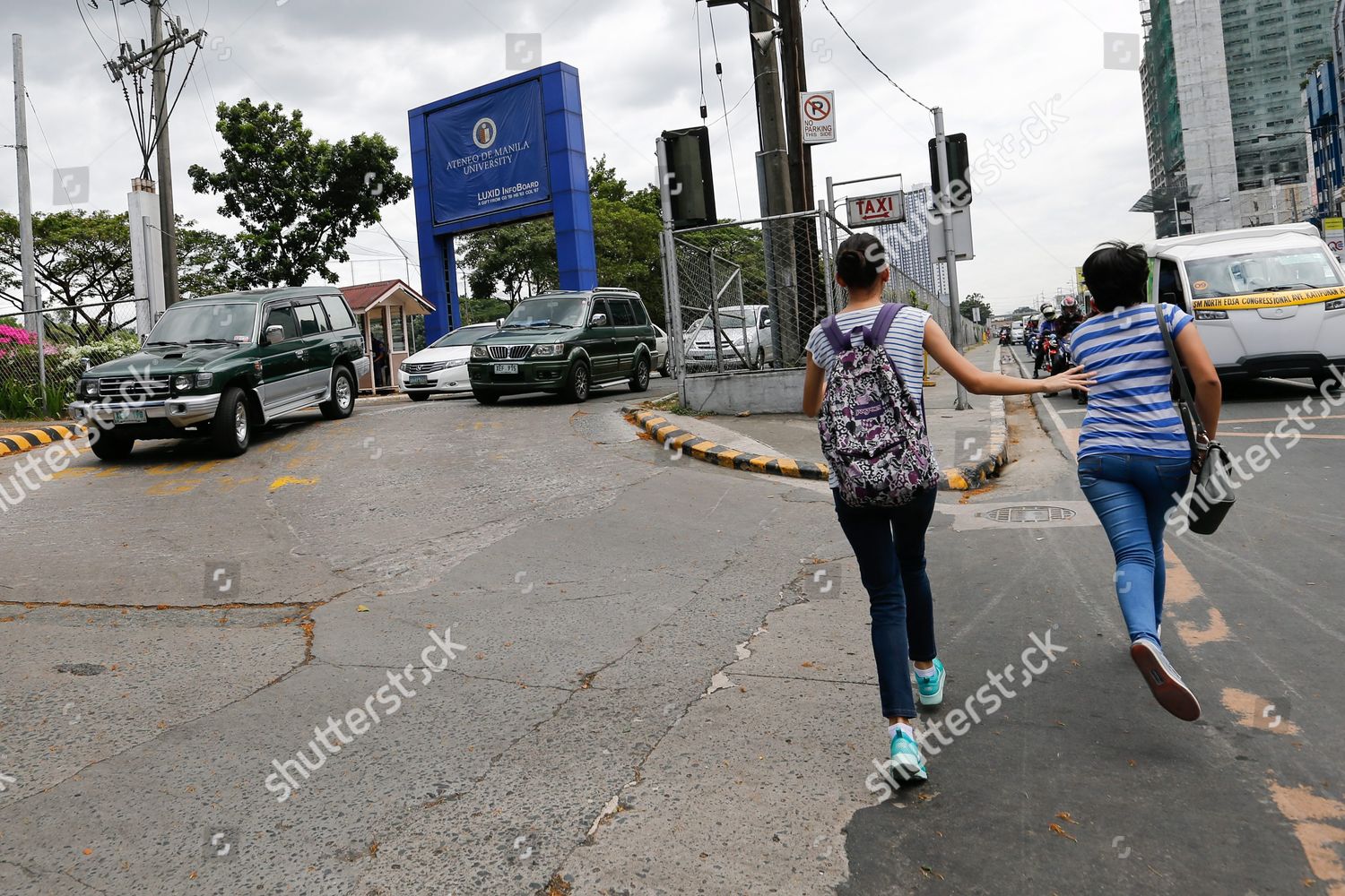 Filipino Students Cross Street Outside Ateneo Editorial Stock Photo ...