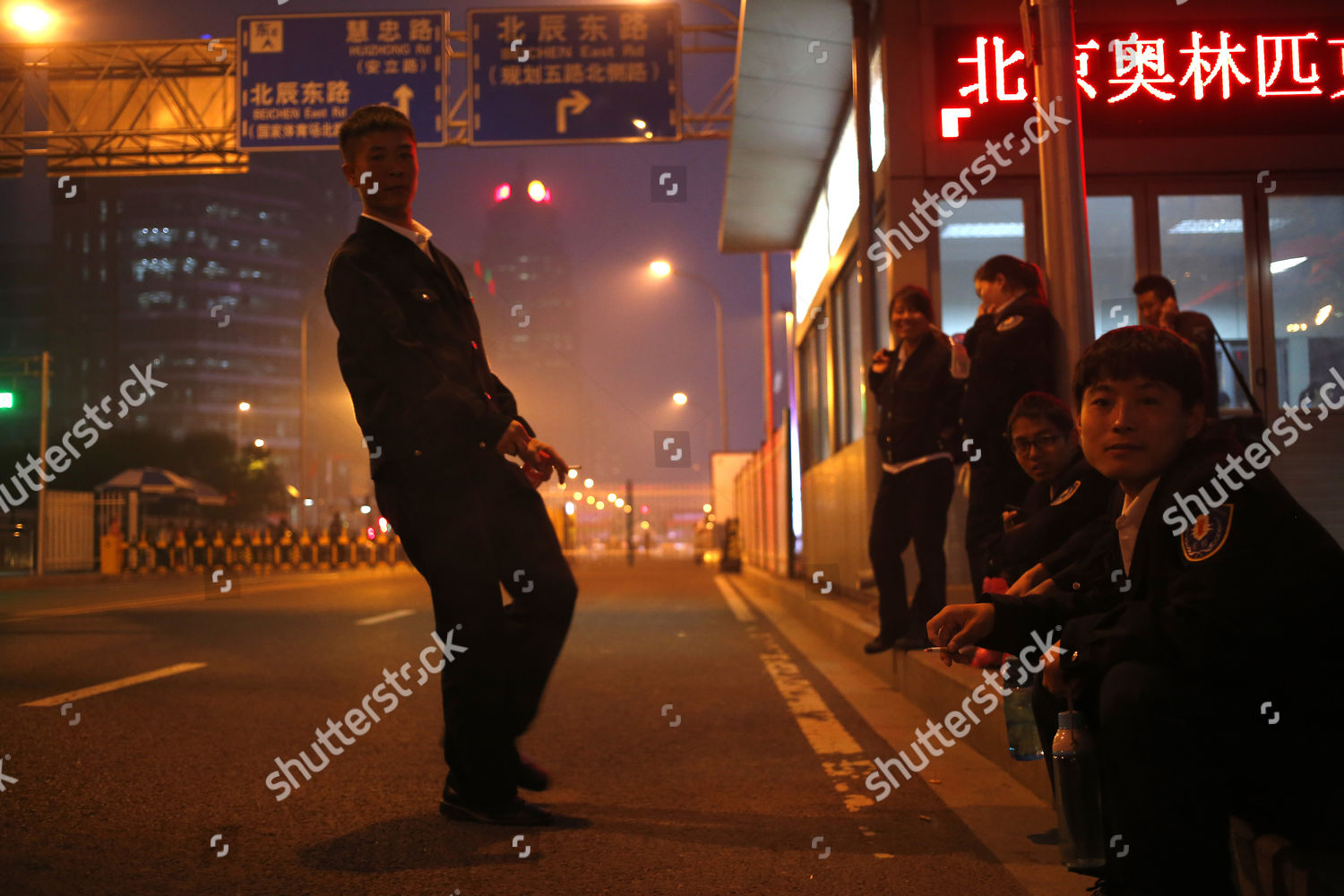 Chinese Security Guards Sit Along Road Editorial Stock Photo - Stock ...