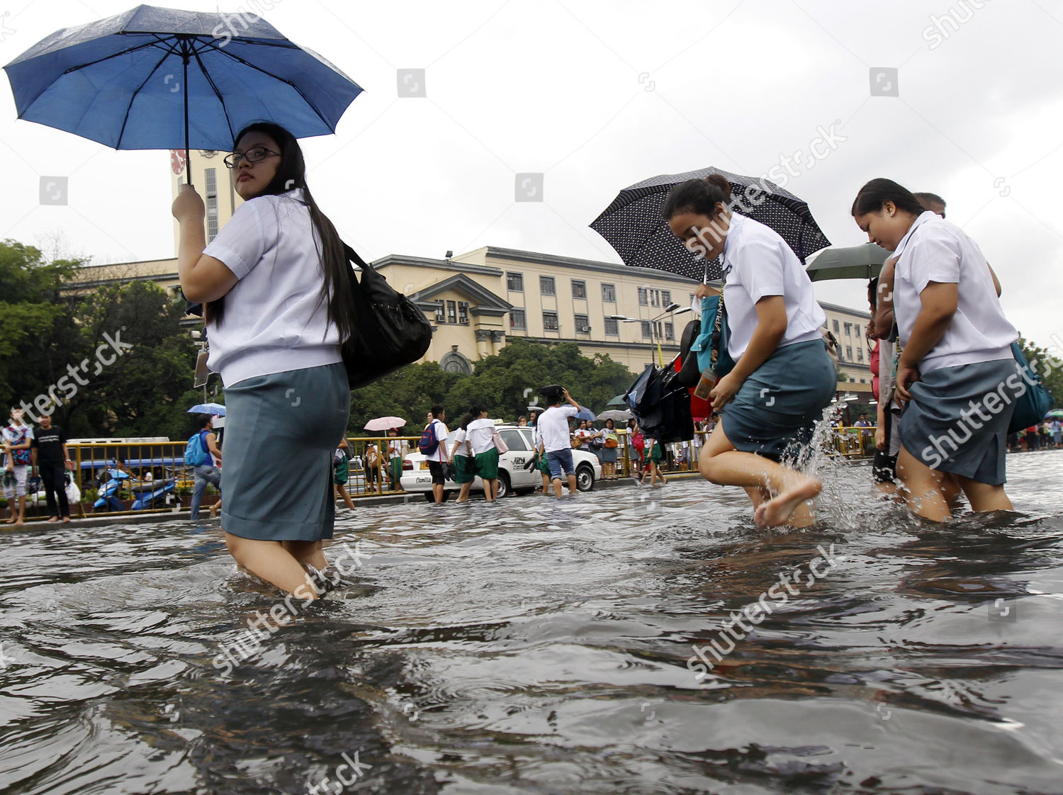 Filipino Students Wade On Flooded Street Editorial Stock Photo - Stock Image | Shutterstock