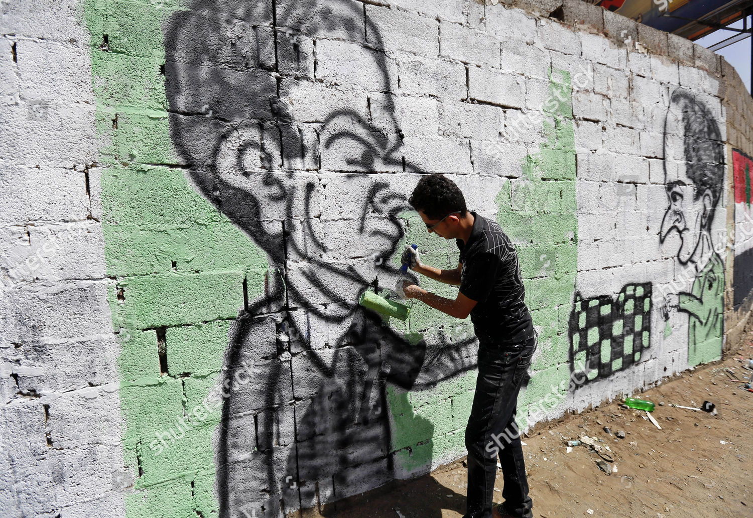 Yemeni Activist Paints Graffiti On Wall Editorial Stock Photo - Stock ...
