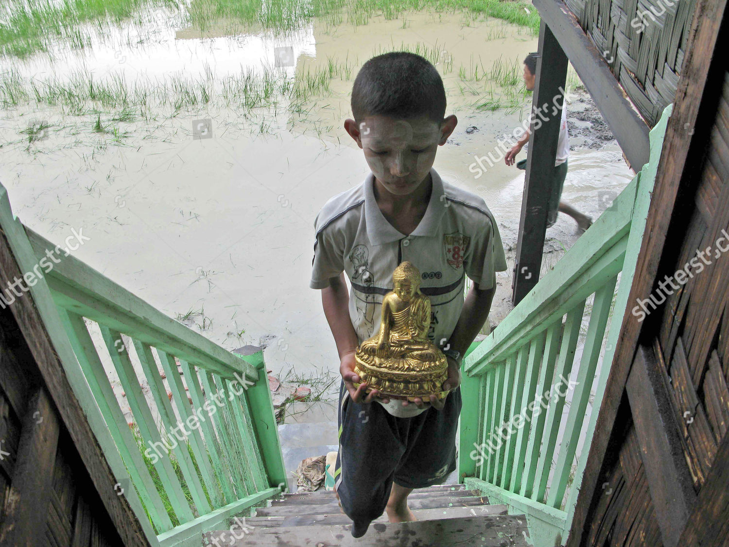 Rakhine Boy Carries Small Buddha Statue Editorial Stock Photo - Stock ...