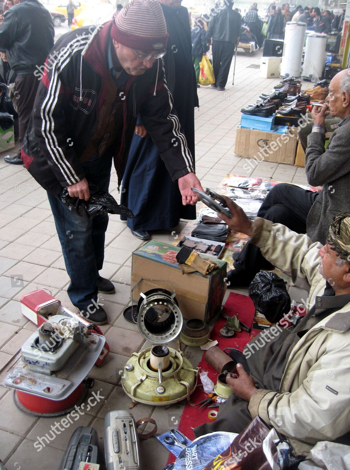 Iraqi Man Displays Old Kerosene Heaters Editorial Stock Photo - Stock ...