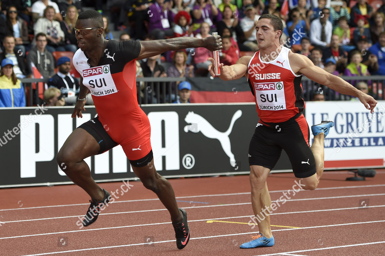Switzerlands Pascal Mancini Right Passes Baton Editorial Stock Photo ...